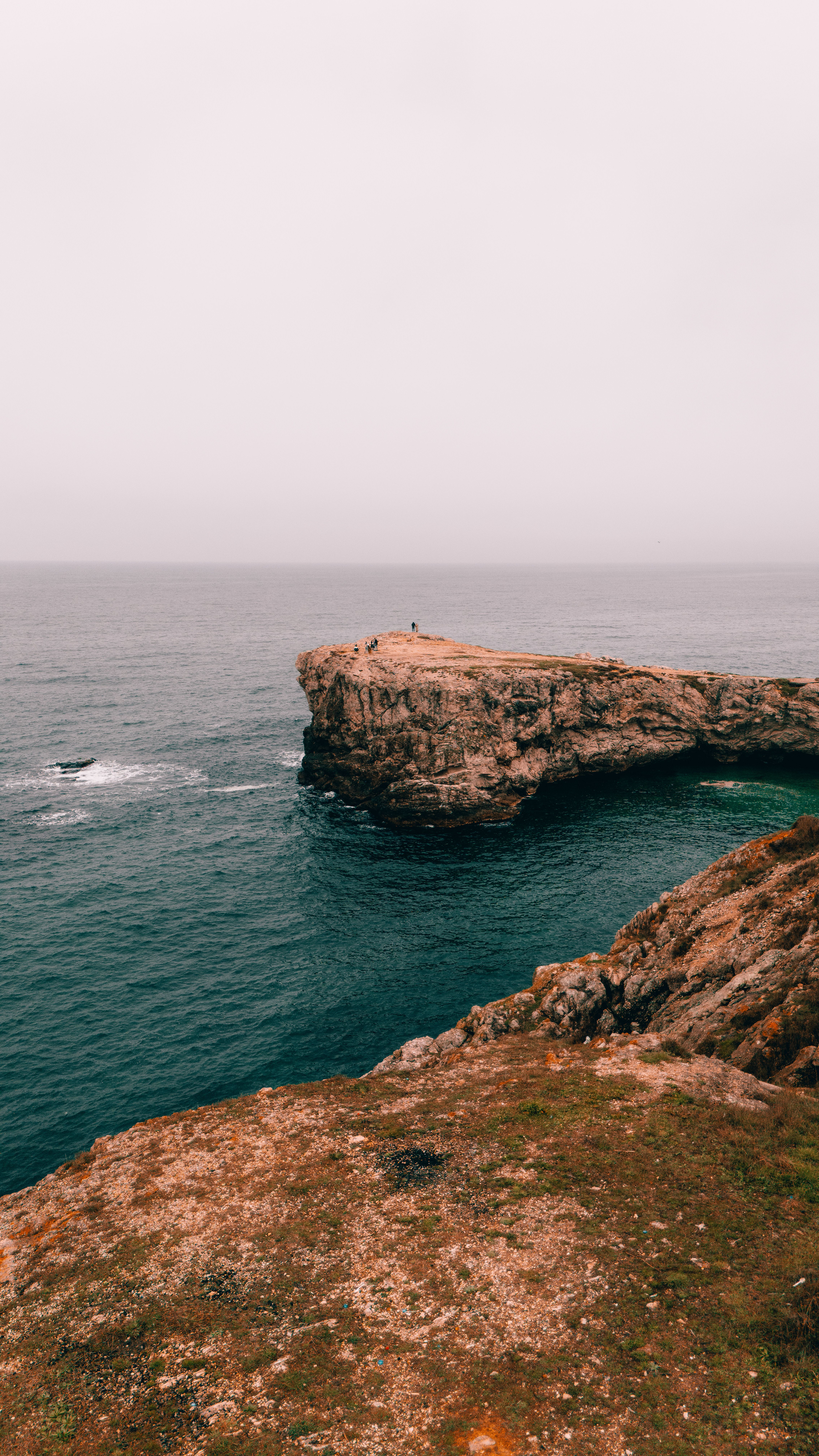 Stunning Coastal Cliff View with Vast Ocean · Free Stock Photo