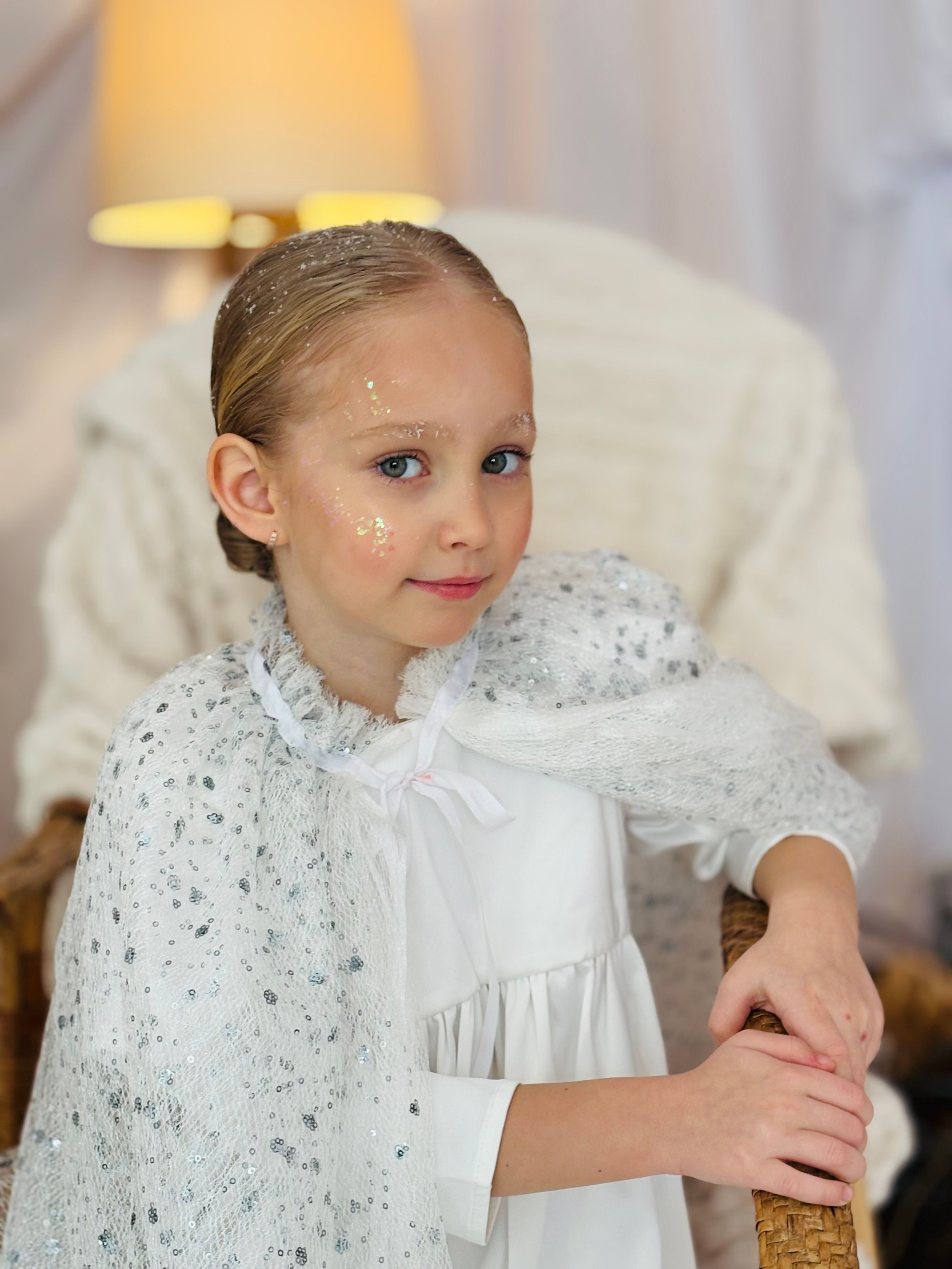 Portrait of Child in Sparkly Cape Indoors · Free Stock Photo