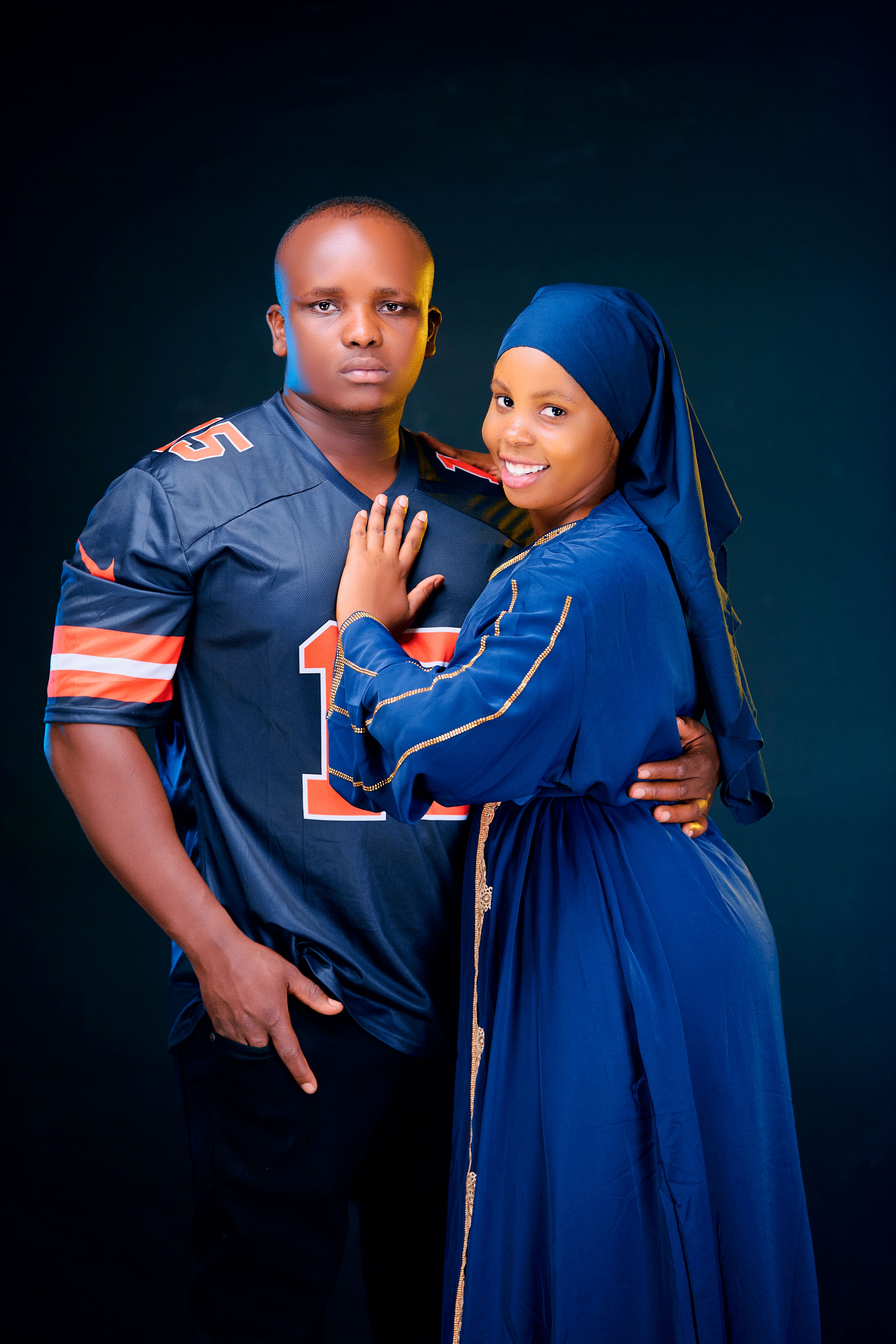Couple in Blue Attire Embracing for Portrait · Free Stock Photo
