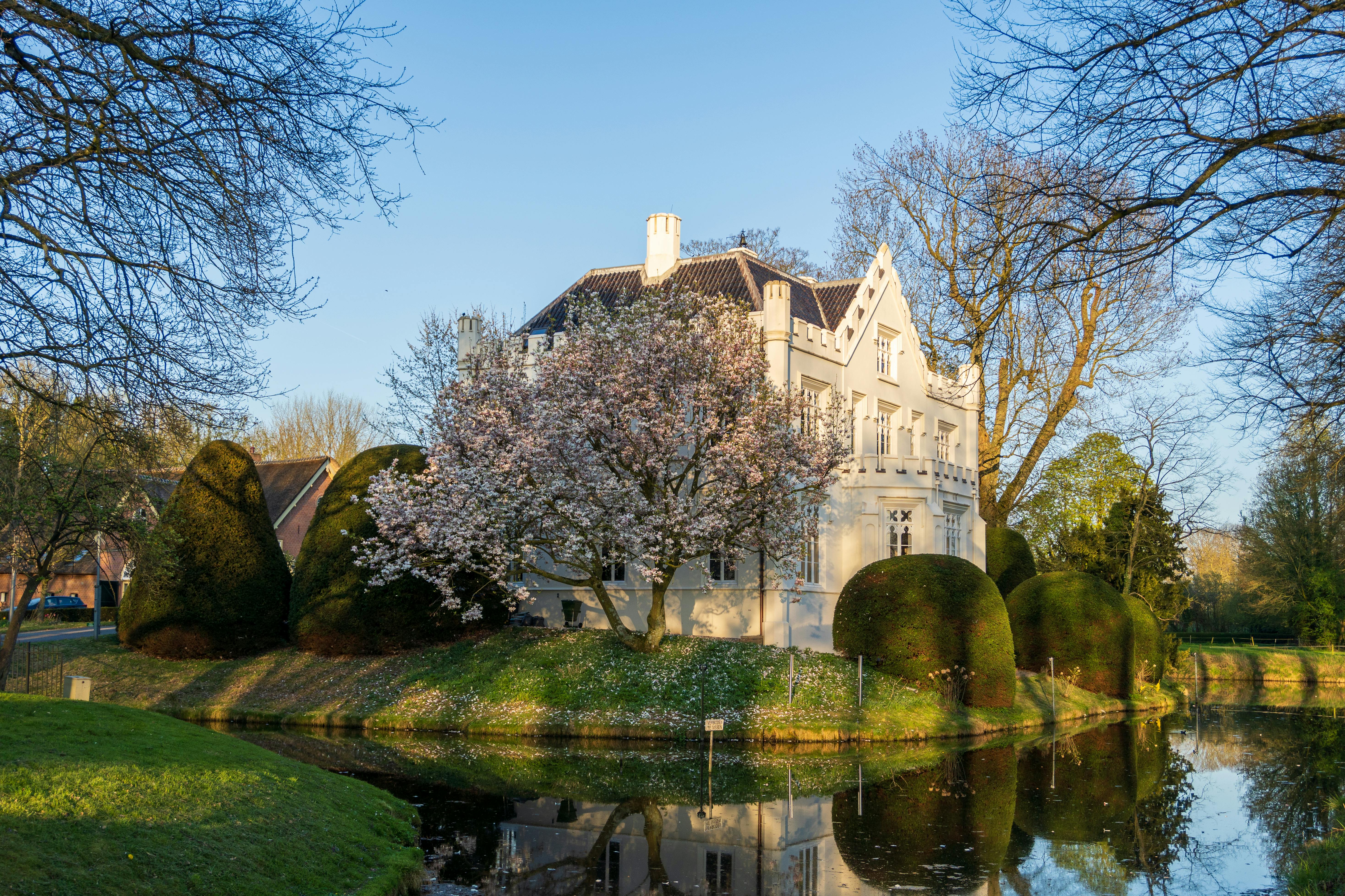 Charming European Mansion in Springtime Landscape · Free Stock Photo