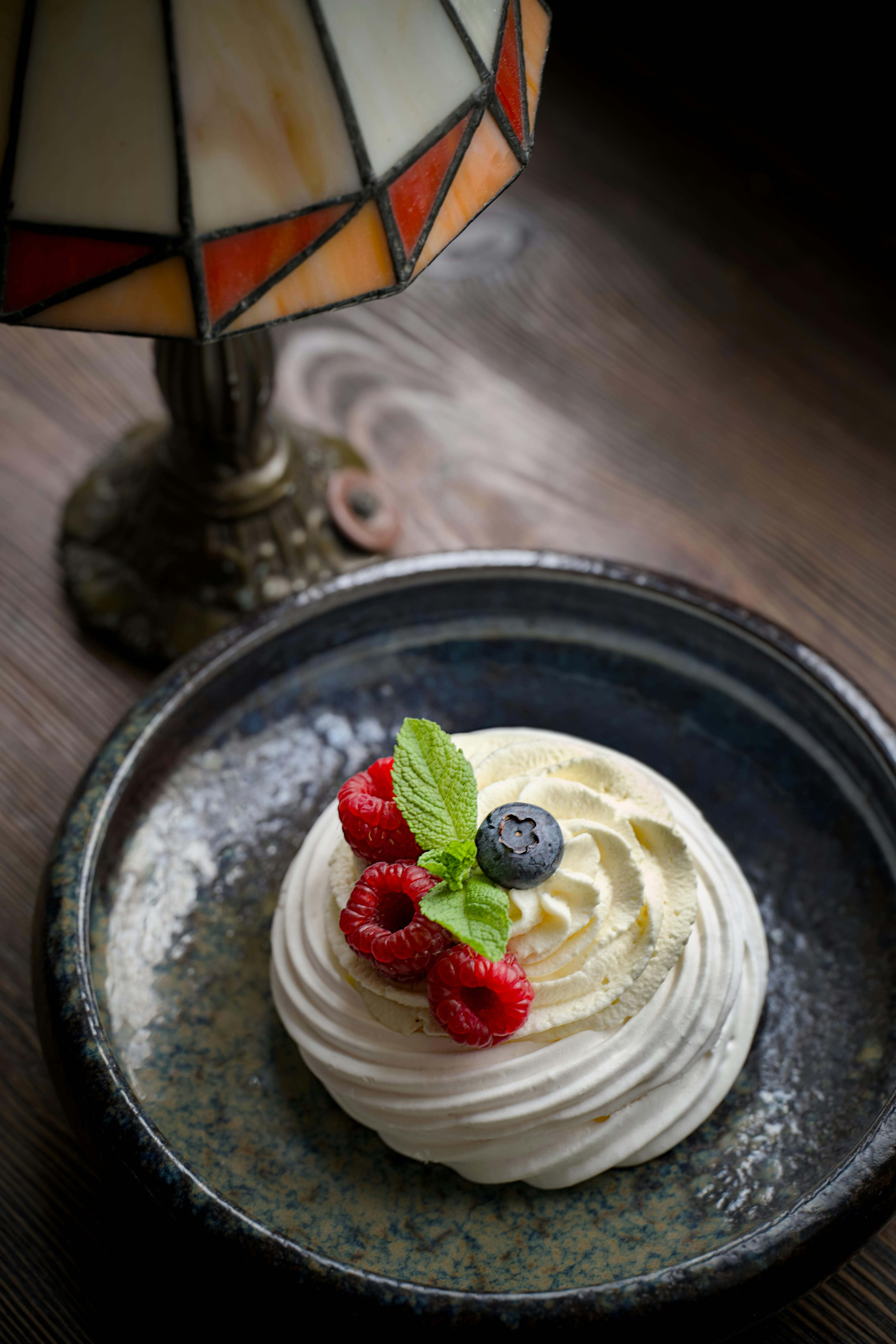 Gourmet Pavlova Dessert with Raspberries and Blueberry · Free Stock Photo
