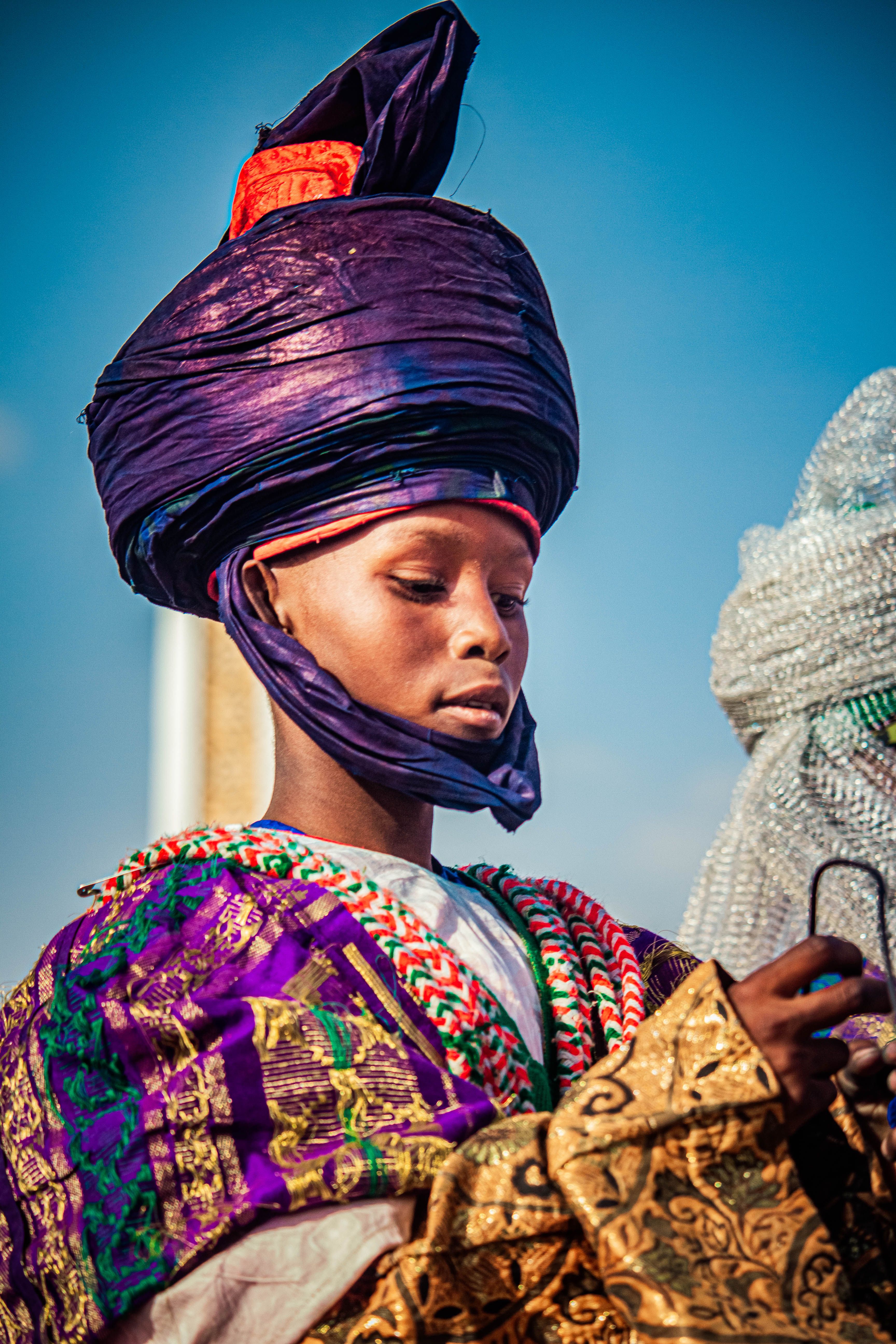 Vibrant Traditional African Attire and Headwrap · Free Stock Photo