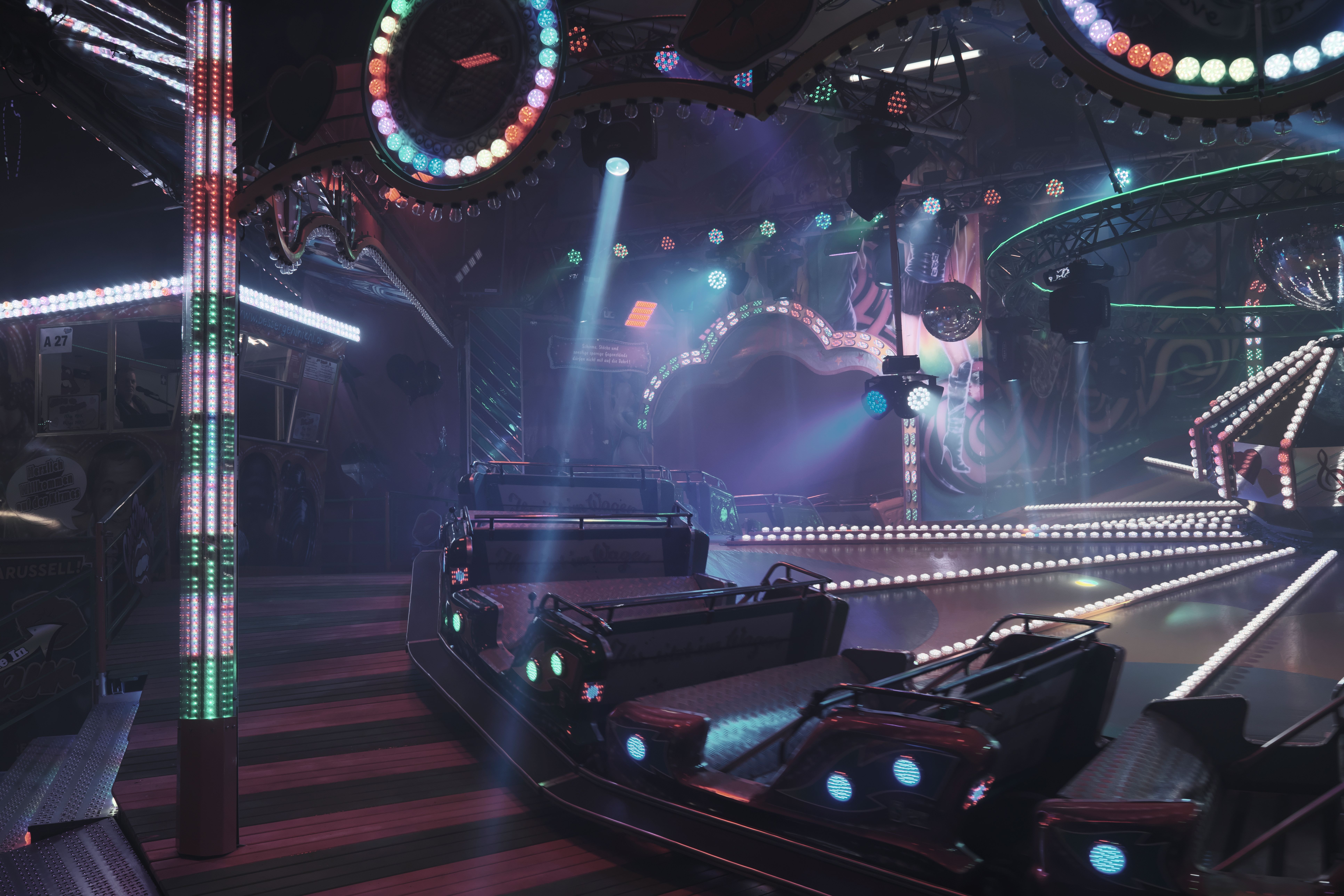 Vibrant Indoor Amusement Park Ride at Night · Free Stock Photo