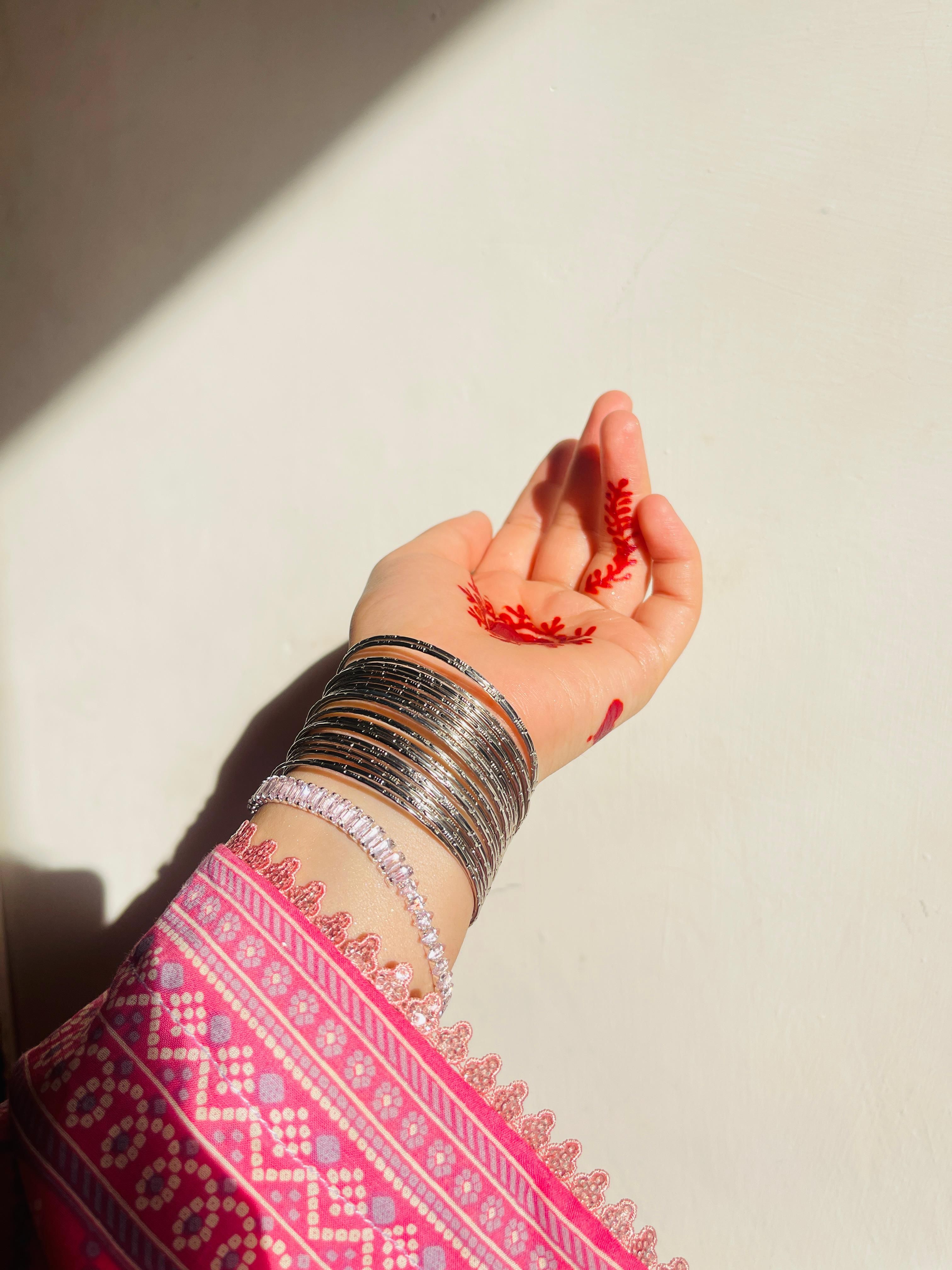Cultural Hand Art with Henna and Bangles · Free Stock Photo