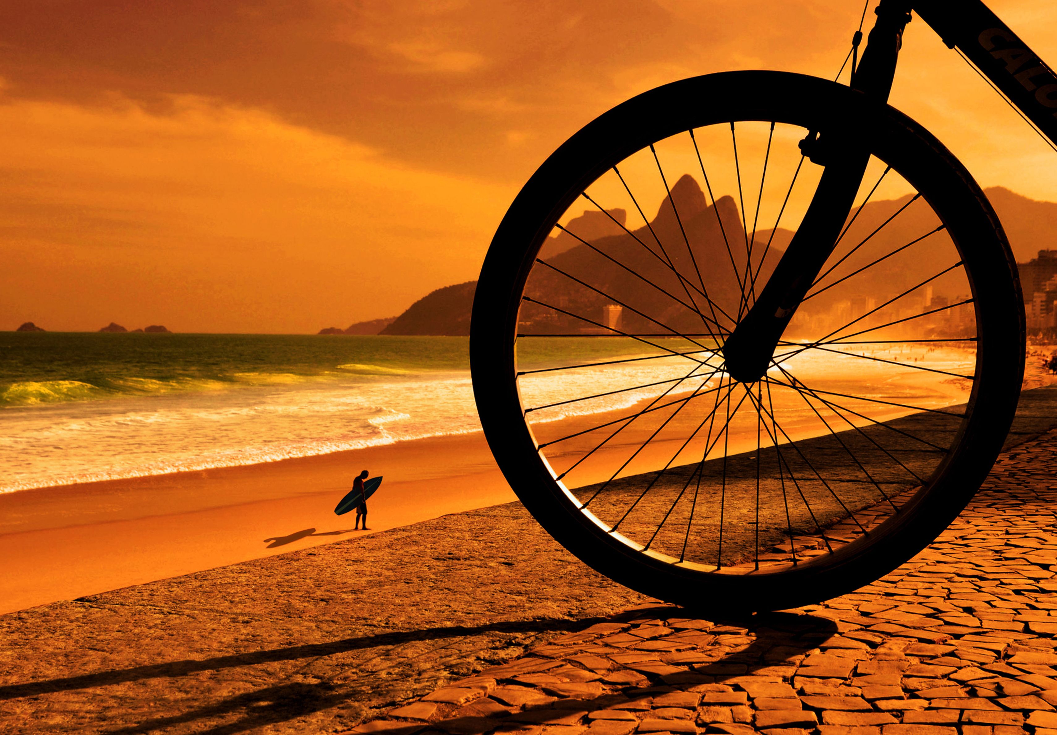 Sunset Beach Scene with Bicycle and Surfer in Brazil · Free Stock Photo