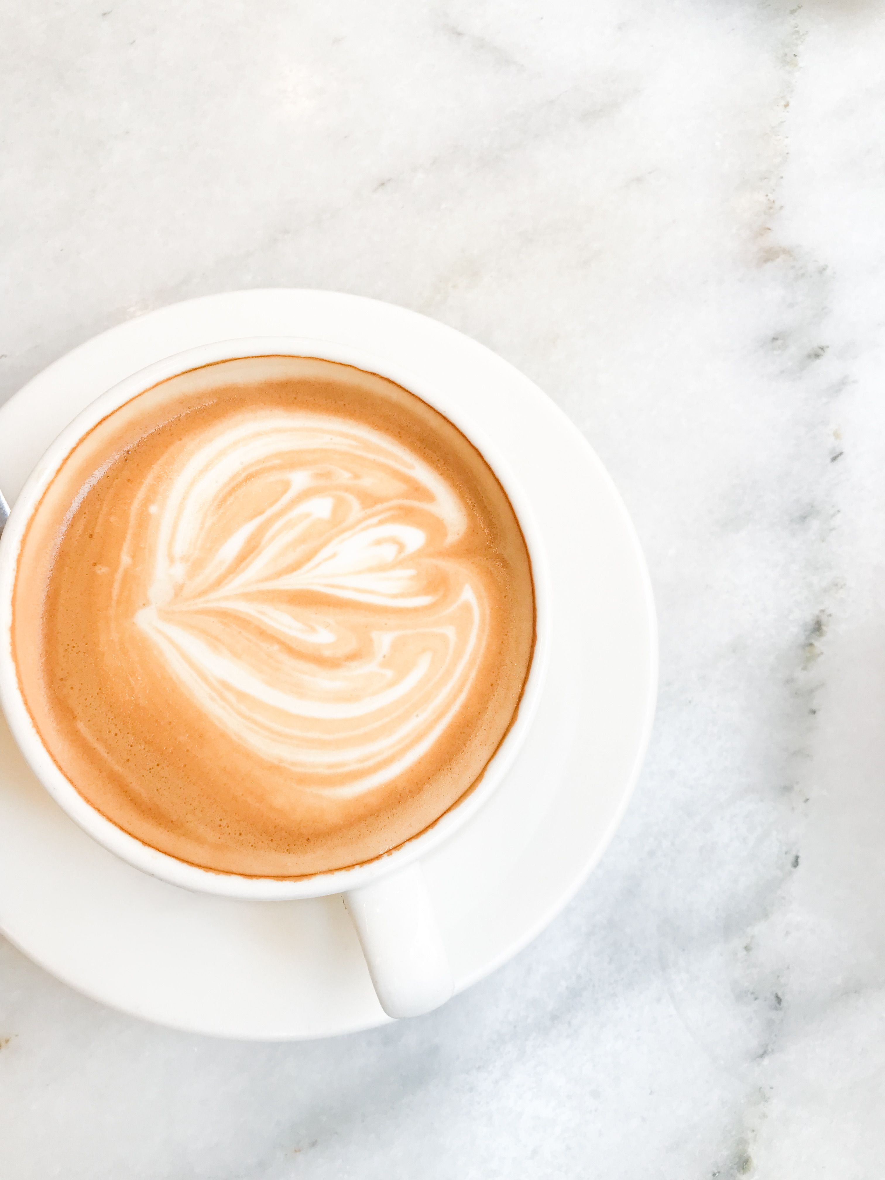 Elegant Latte with Heart Design on Marble · Free Stock Photo