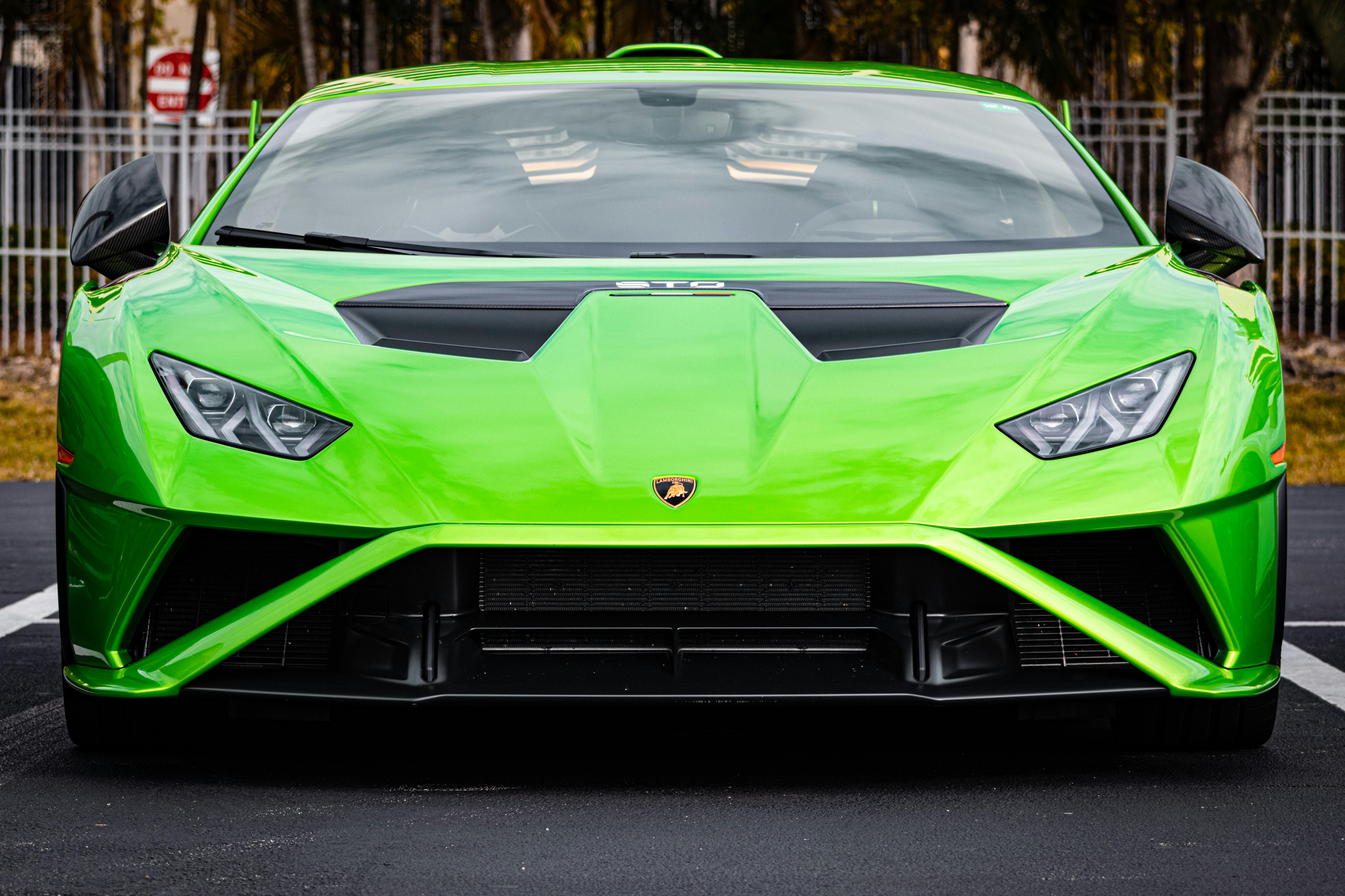 Vibrant Green Sports Car in Miami Street · Free Stock Photo