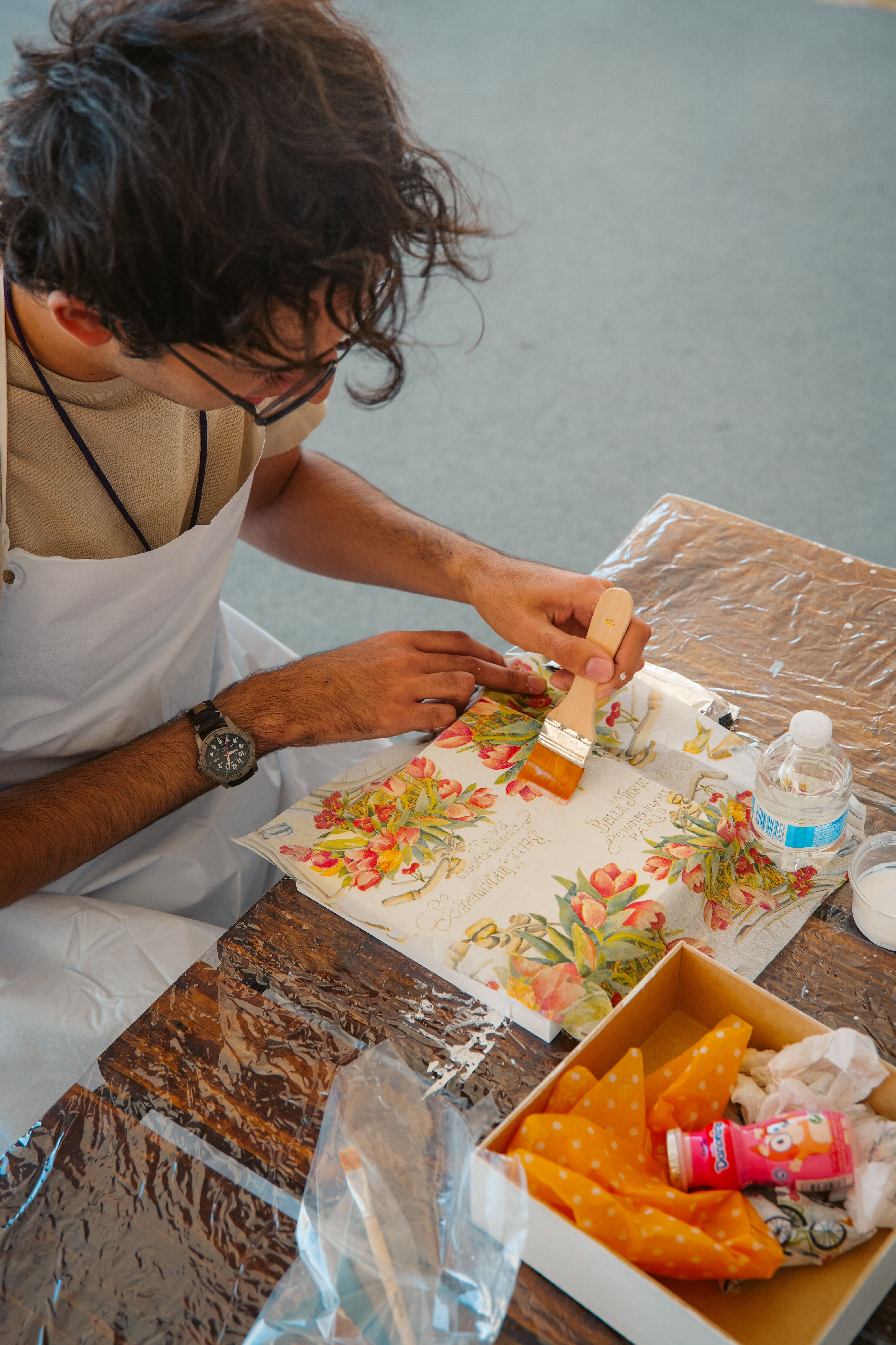 Man Crafting with Decoupage on Wooden Desk · Free Stock Photo