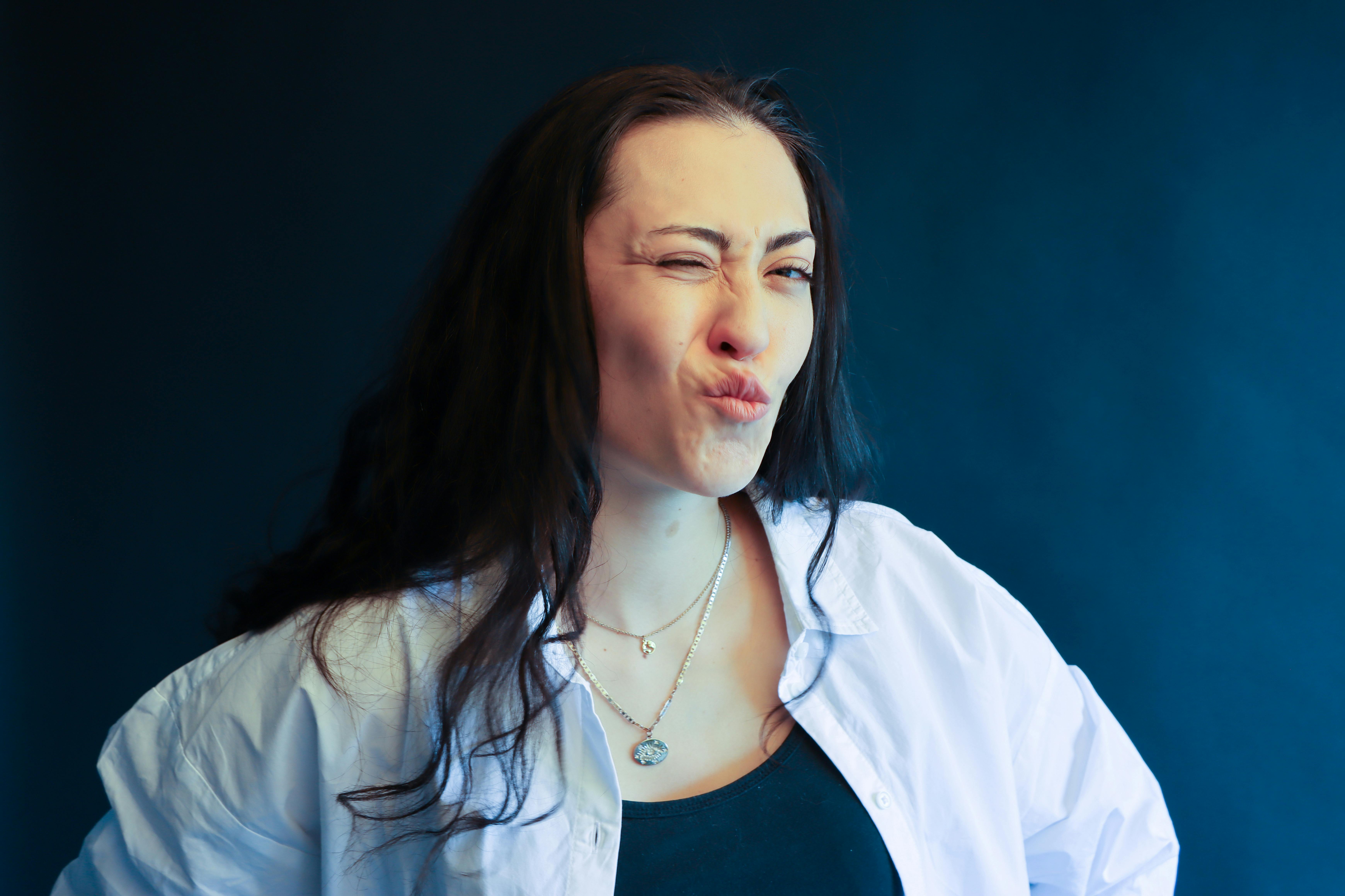 Playful Portrait of a Woman in Berlin Studio · Free Stock Photo