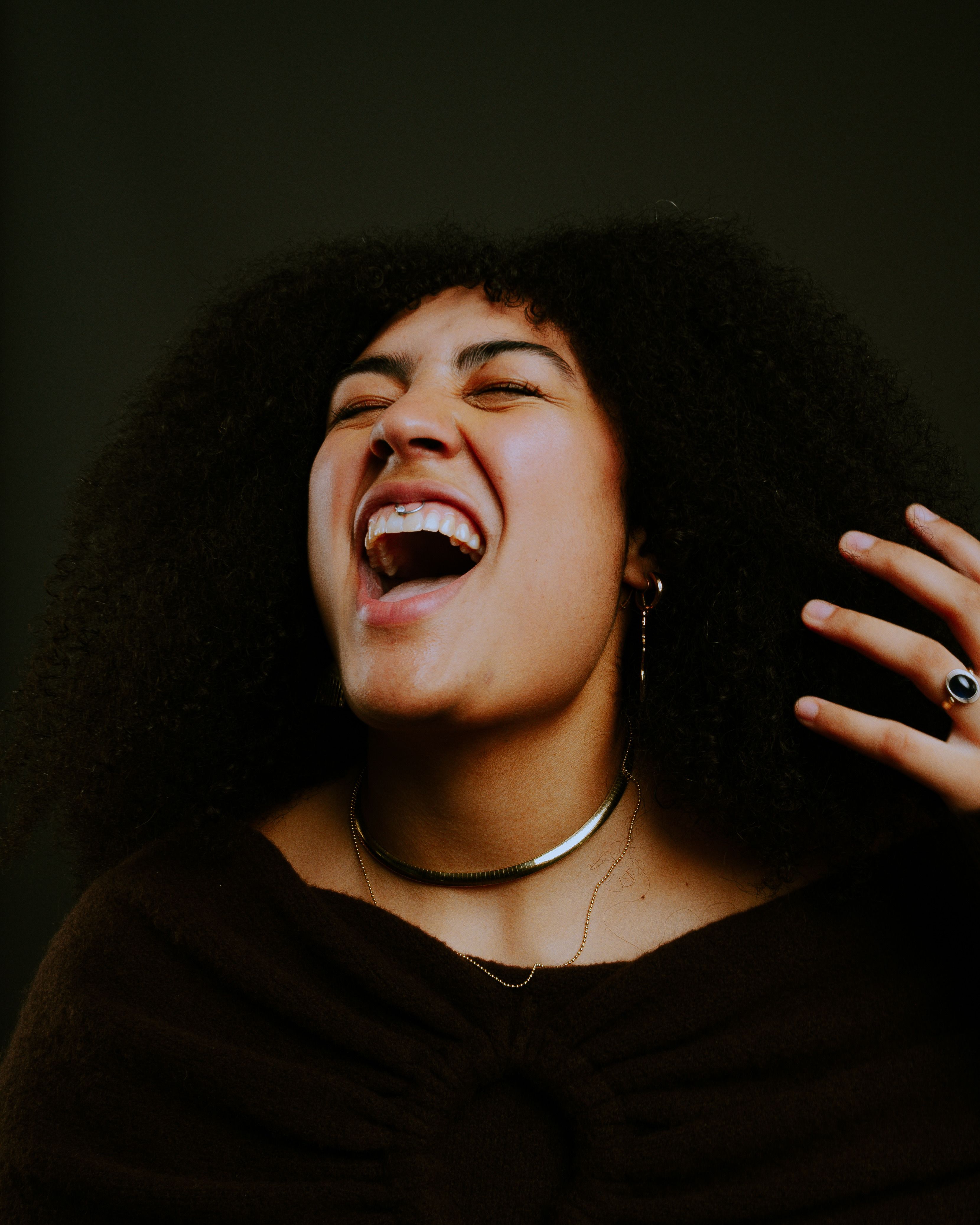 Expressive Portrait of a Joyful Woman · Free Stock Photo