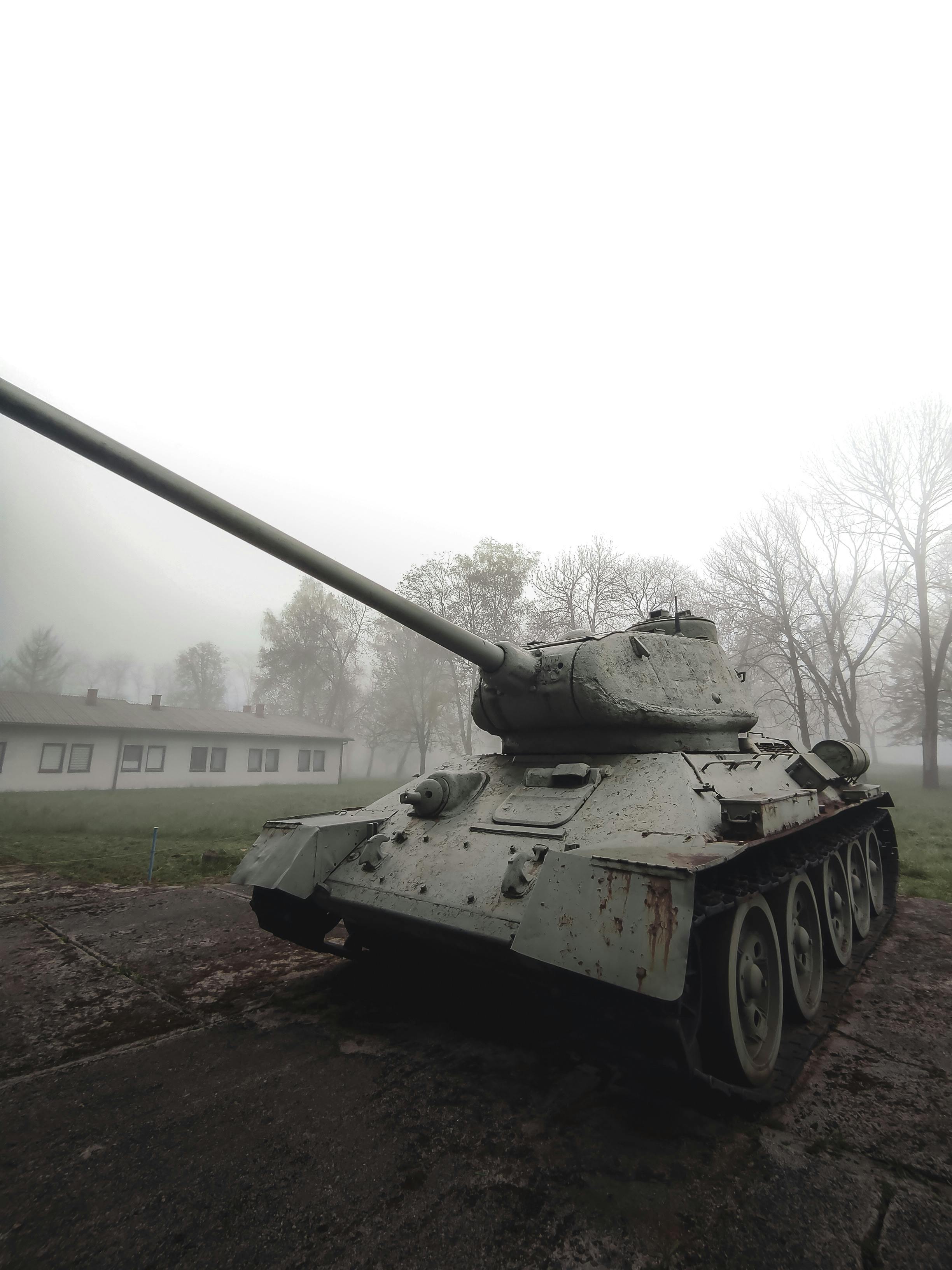 Vintage Soviet Tank in Foggy Landscape · Free Stock Photo