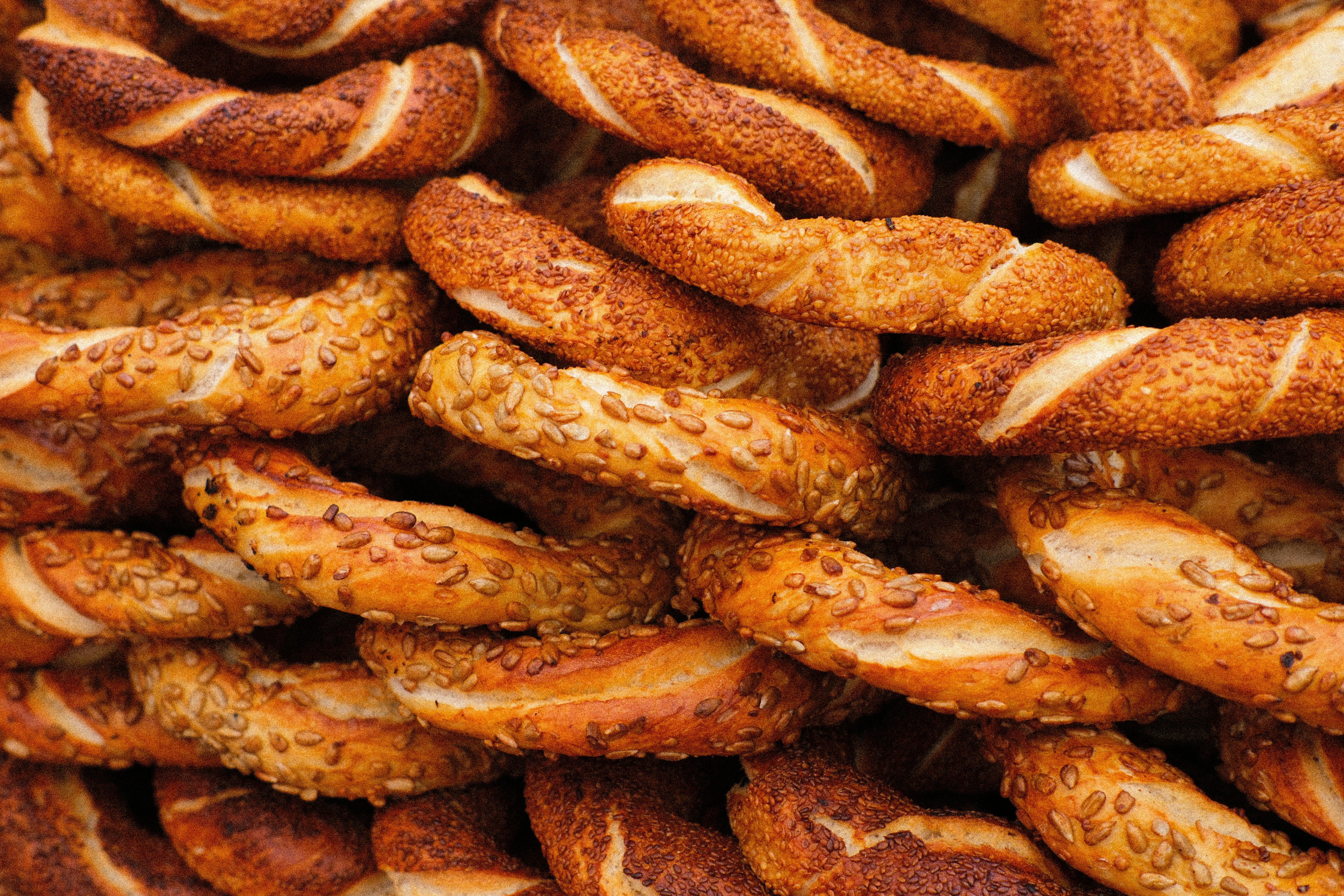 Pile of Freshly Baked Turkish Simit Rings · Free Stock Photo
