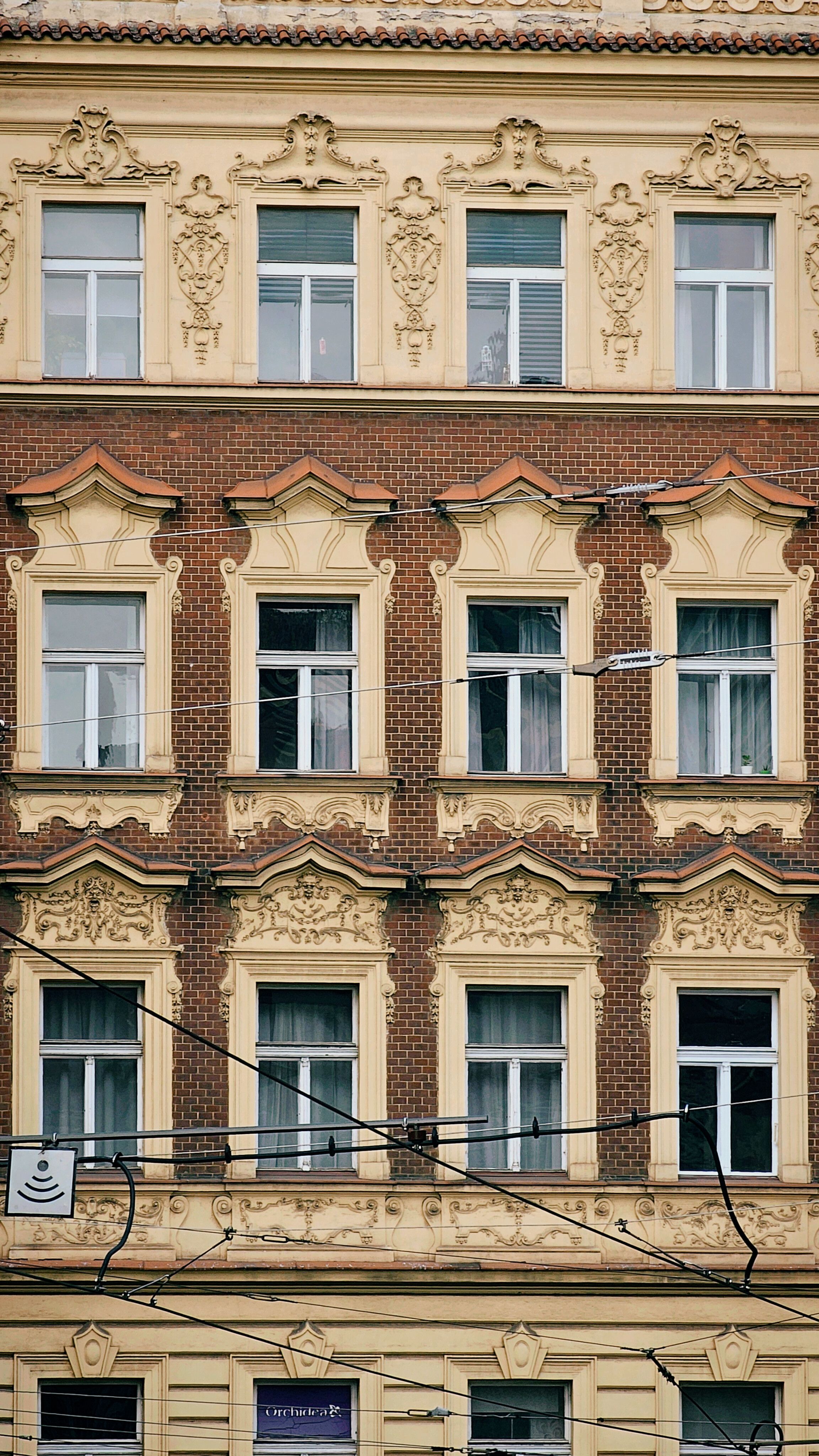 Ornate Historic Building Facade with Windows · Free Stock Photo