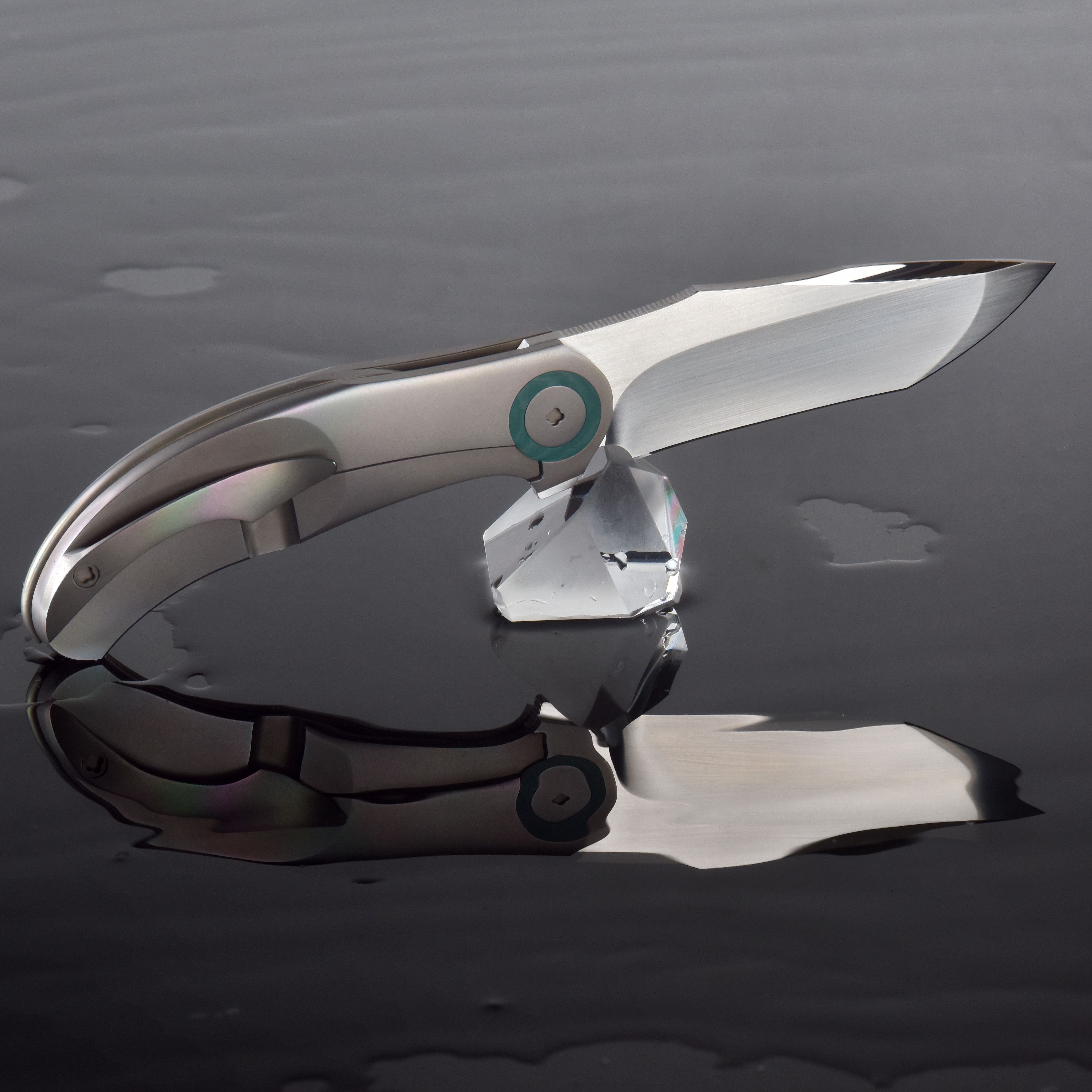 Sleek Modern Knife with Reflection on Water · Free Stock Photo