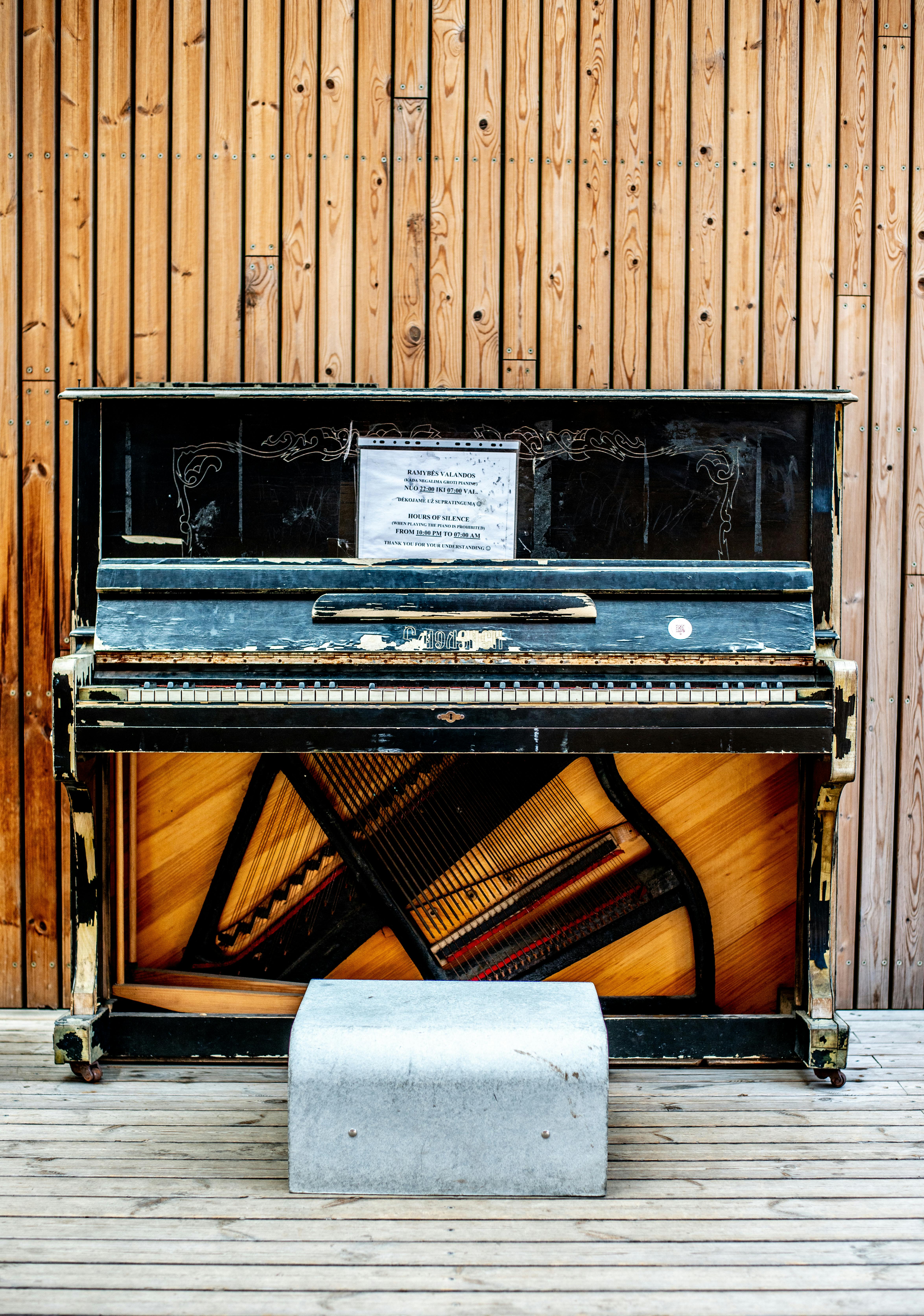Rustic Vintage Piano Against Wooden Background · Free Stock Photo