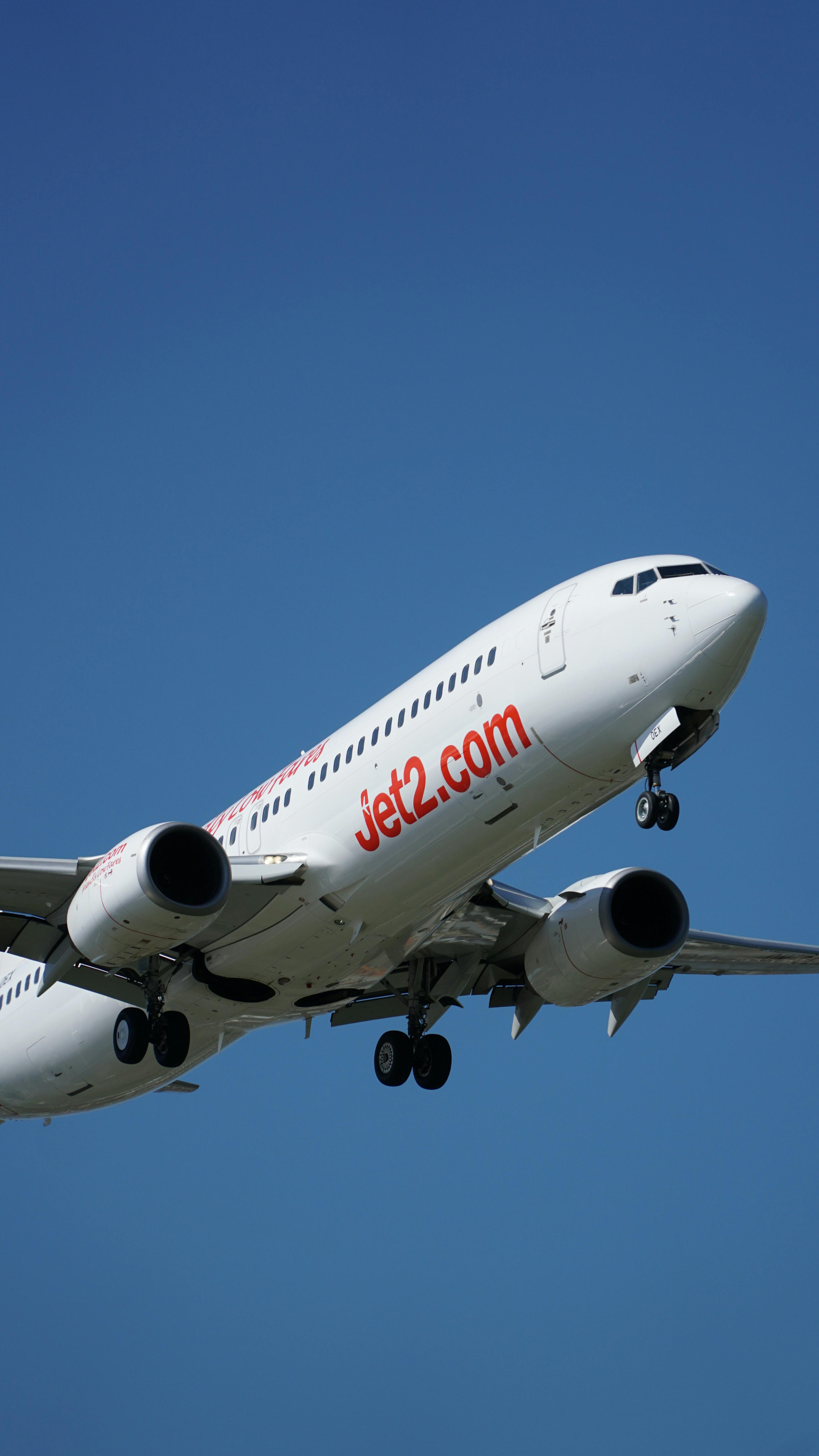 Jet2.com Airplane in Clear Blue Sky · Free Stock Photo
