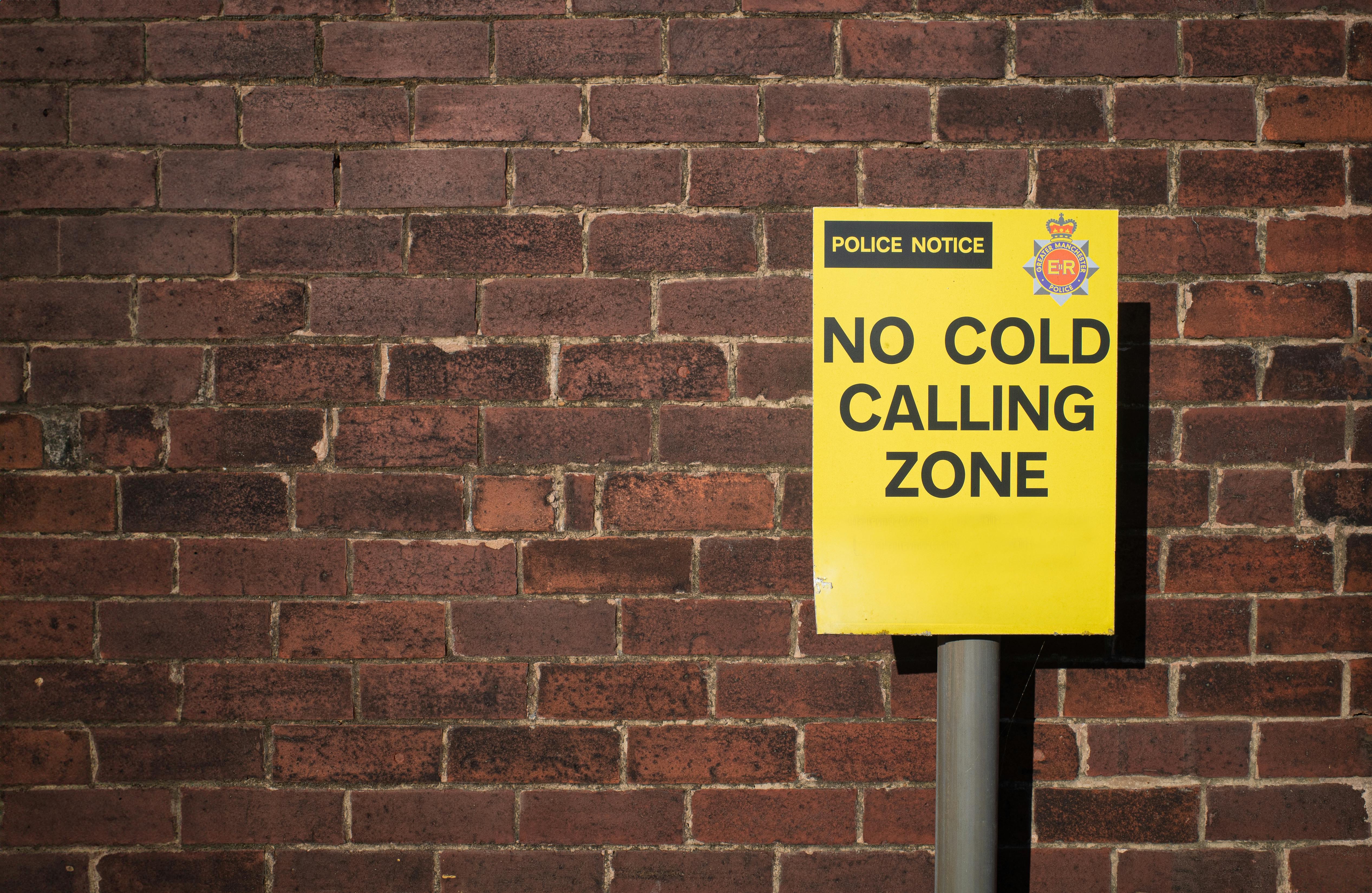 Police Notice Sign on Brick Wall Background · Free Stock Photo