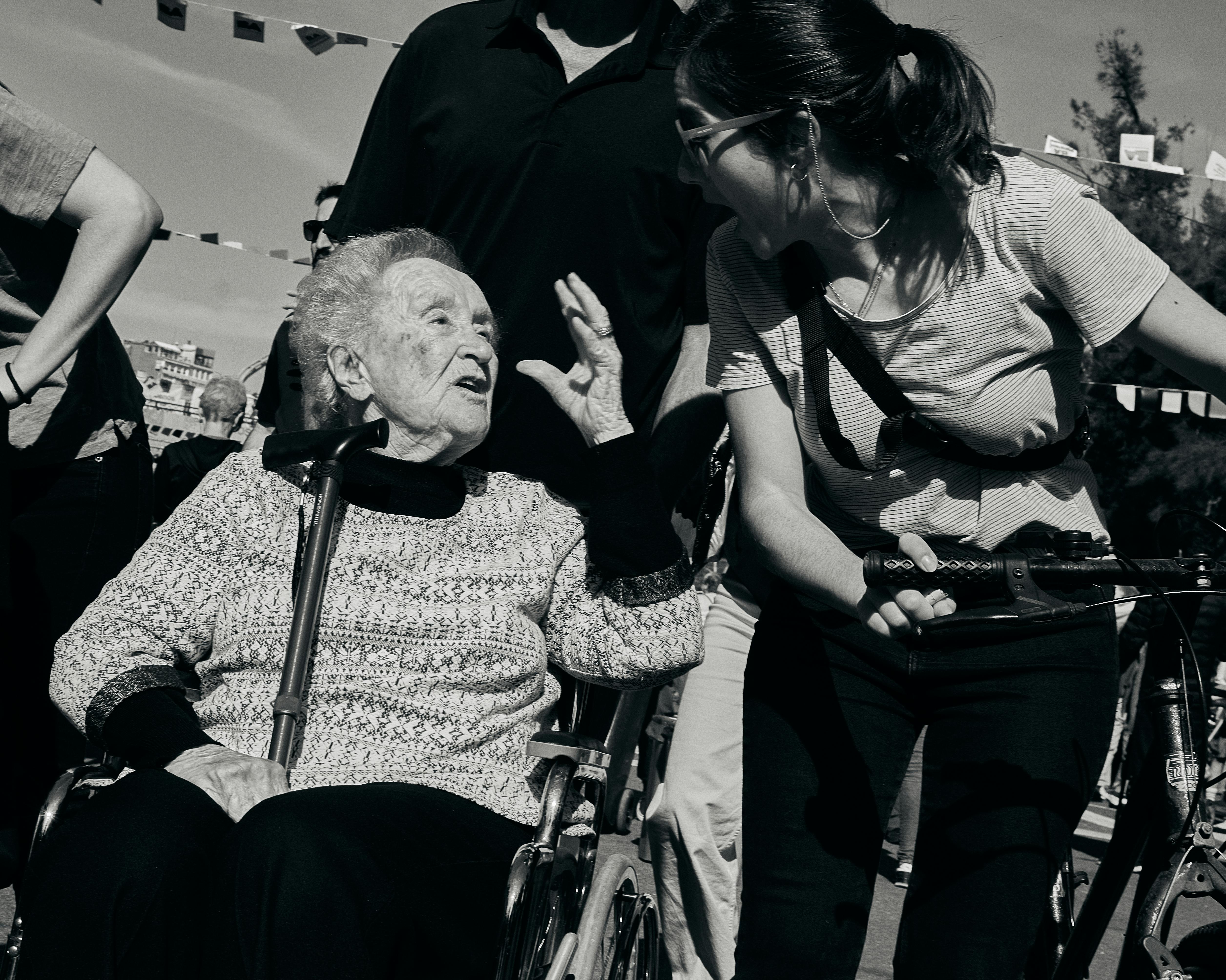 Joyful Interaction Between Generations Outdoors · Free Stock Photo