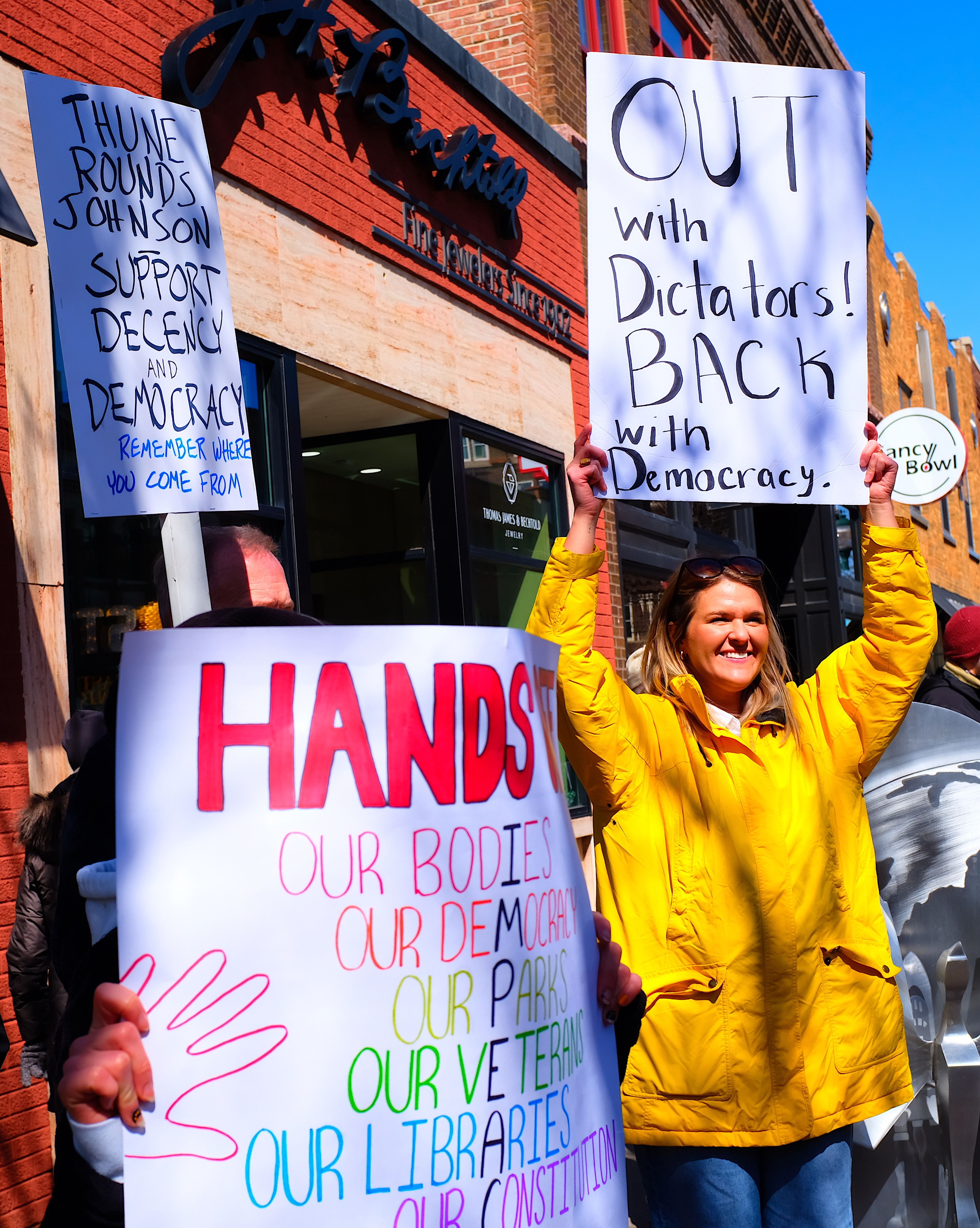 Protesters Holding Signs Promoting Democracy · Free Stock Photo