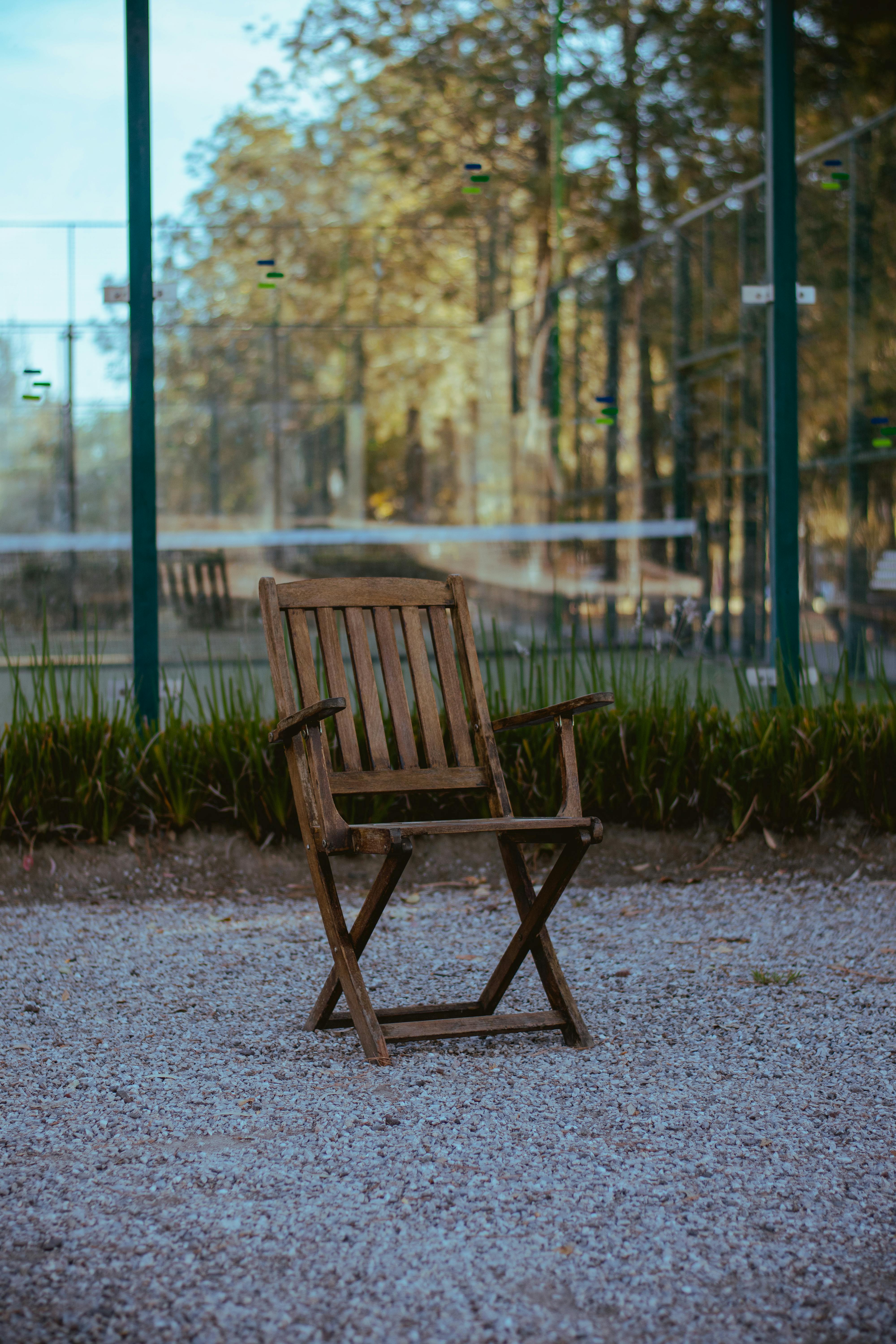 Rustic Wooden Chair in Outdoor Garden Setting · Free Stock Photo