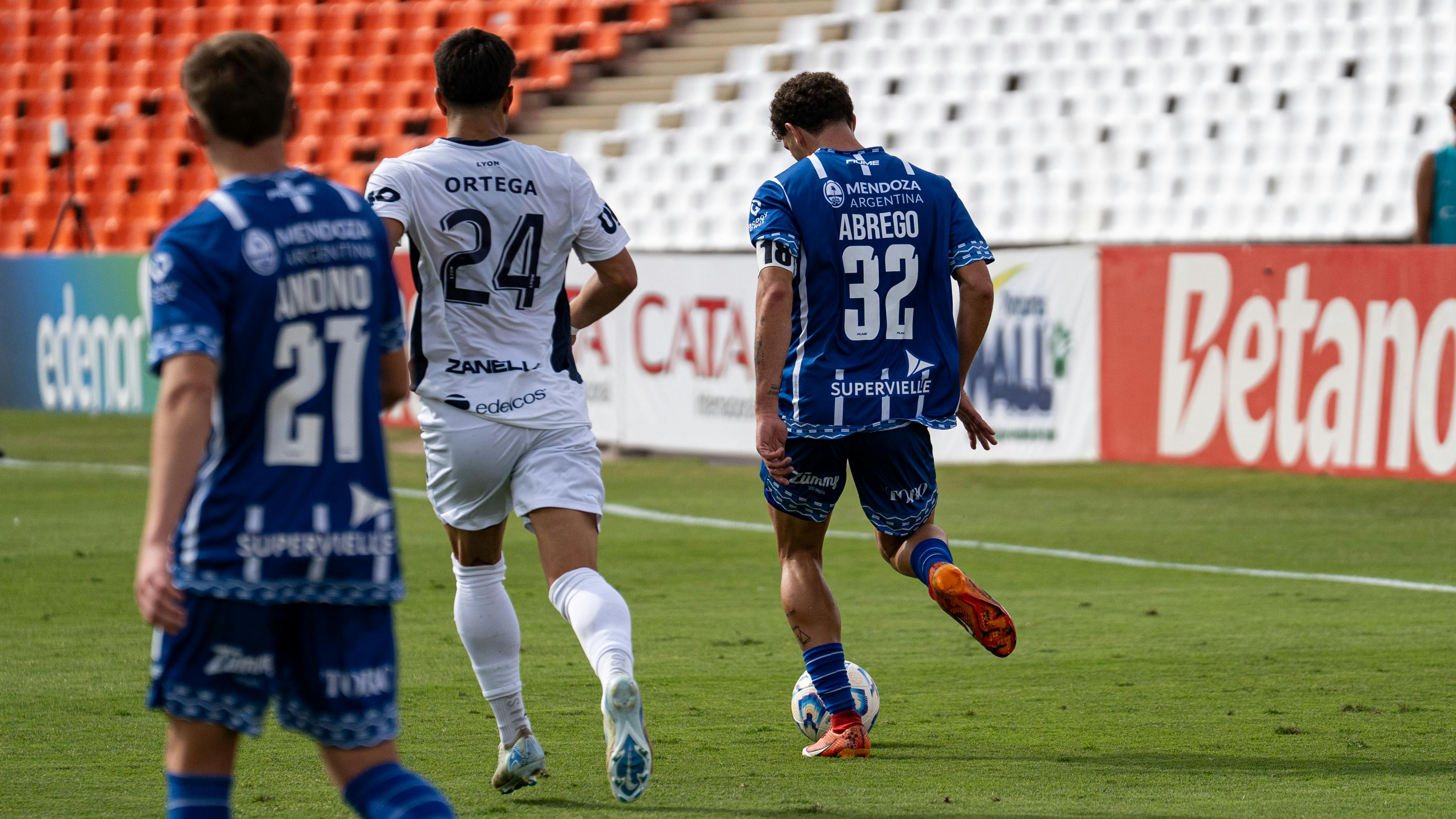 Professional Soccer Match Action in Stadium · Free Stock Photo