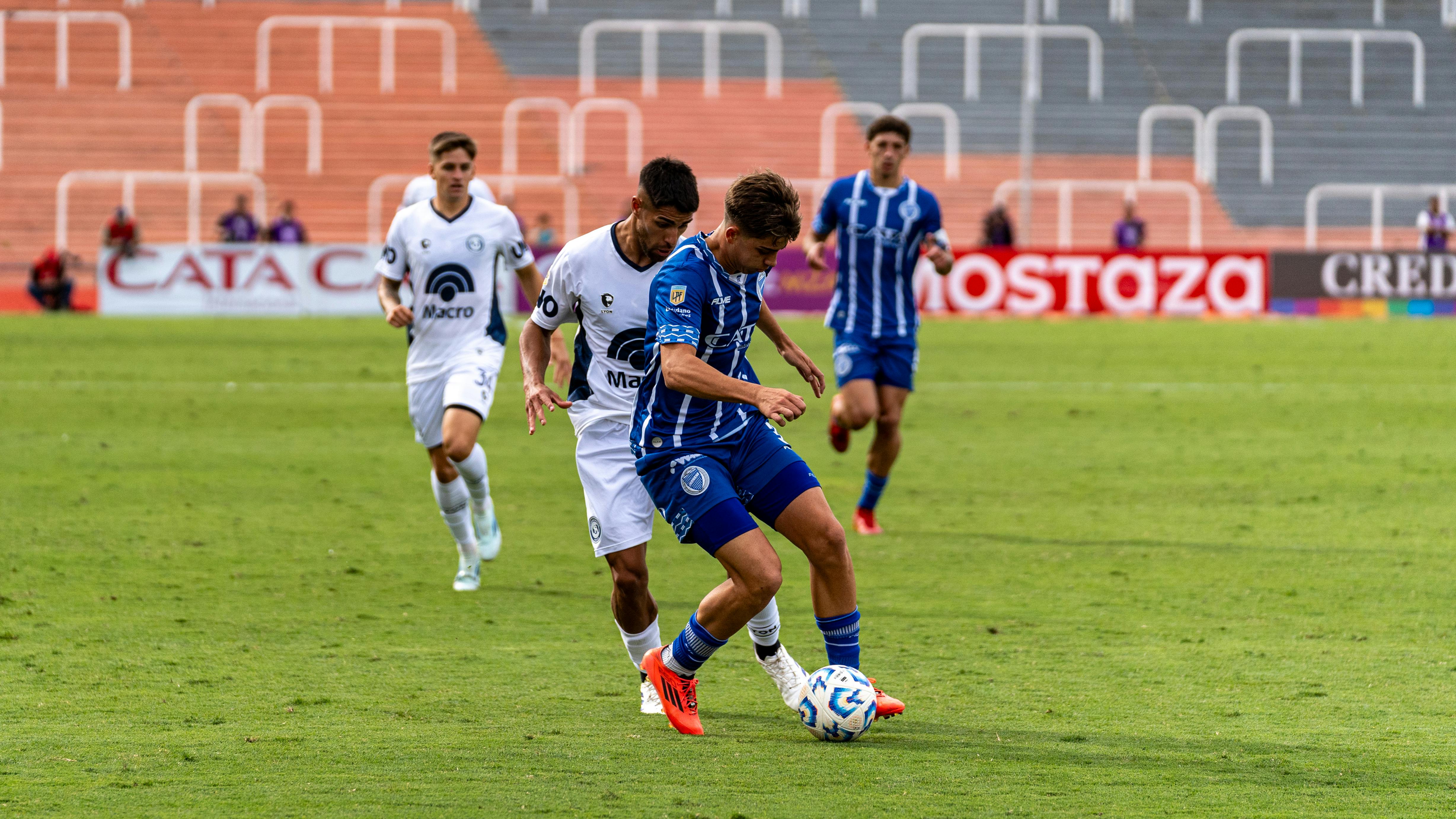 Intense Soccer Match in Stadium · Free Stock Photo