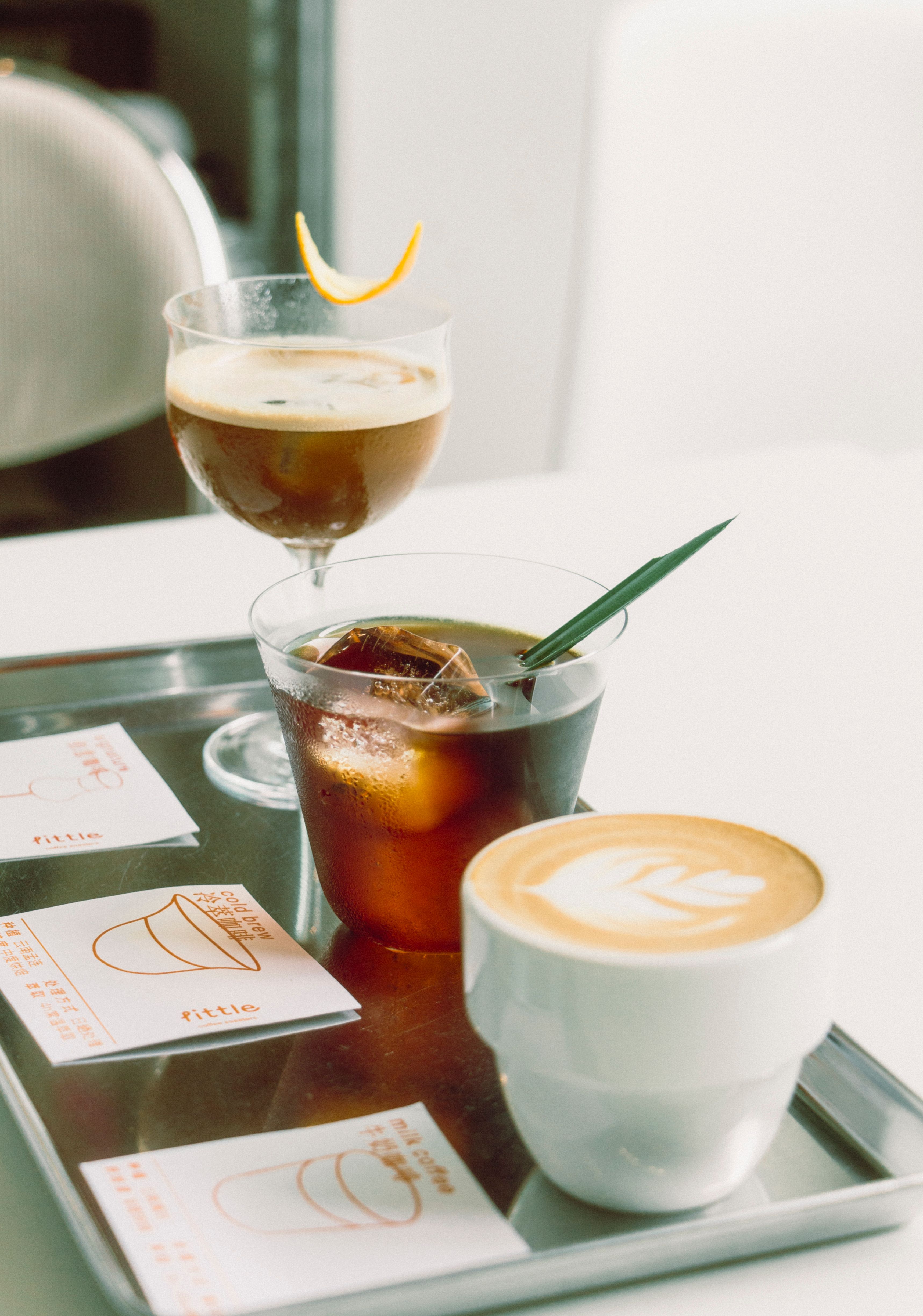 Assorted Coffee Drinks on a Tray in Yunnan Café · Free Stock Photo