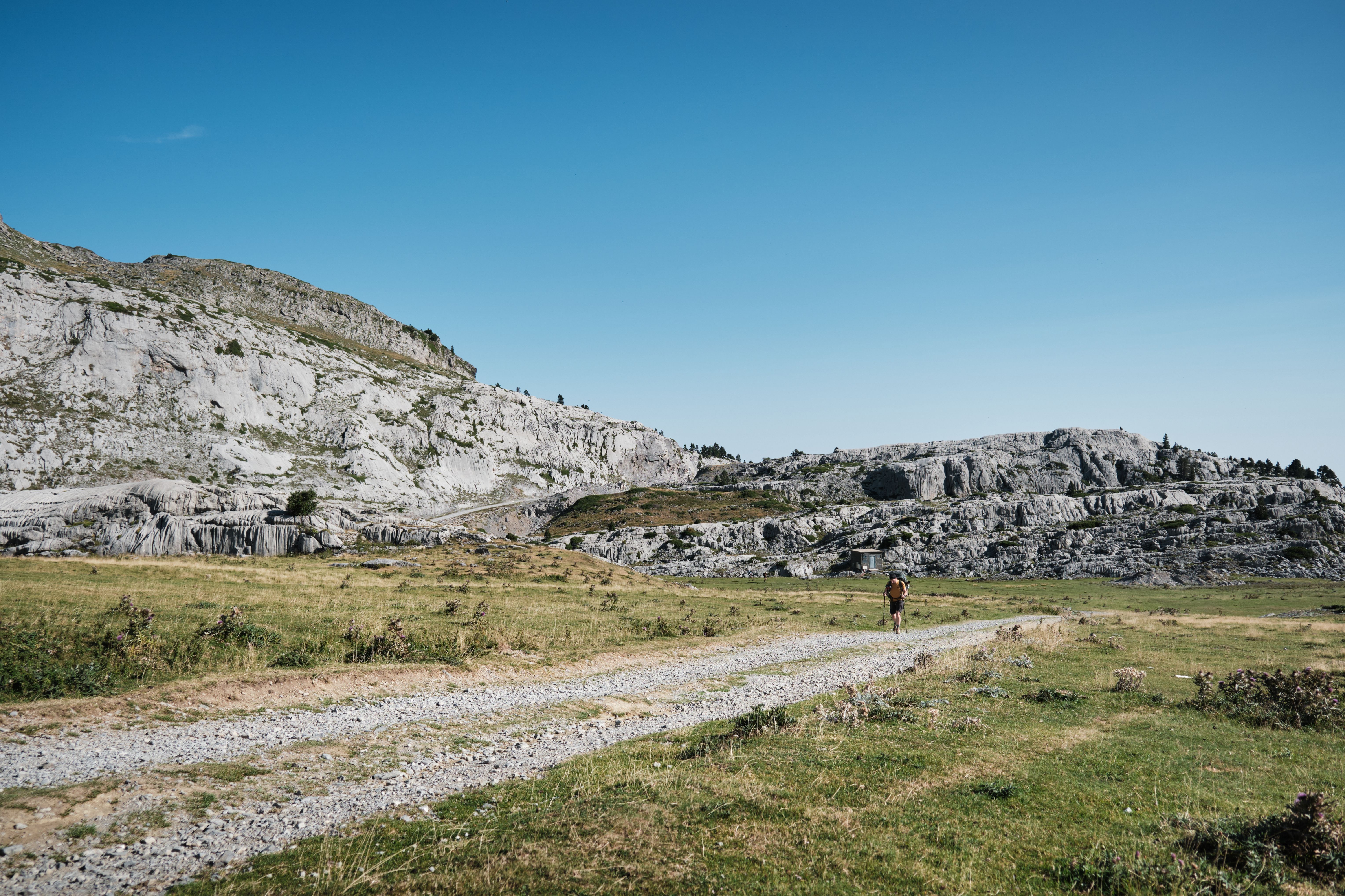 Hiker on Scenic Path in Arette, France · Free Stock Photo