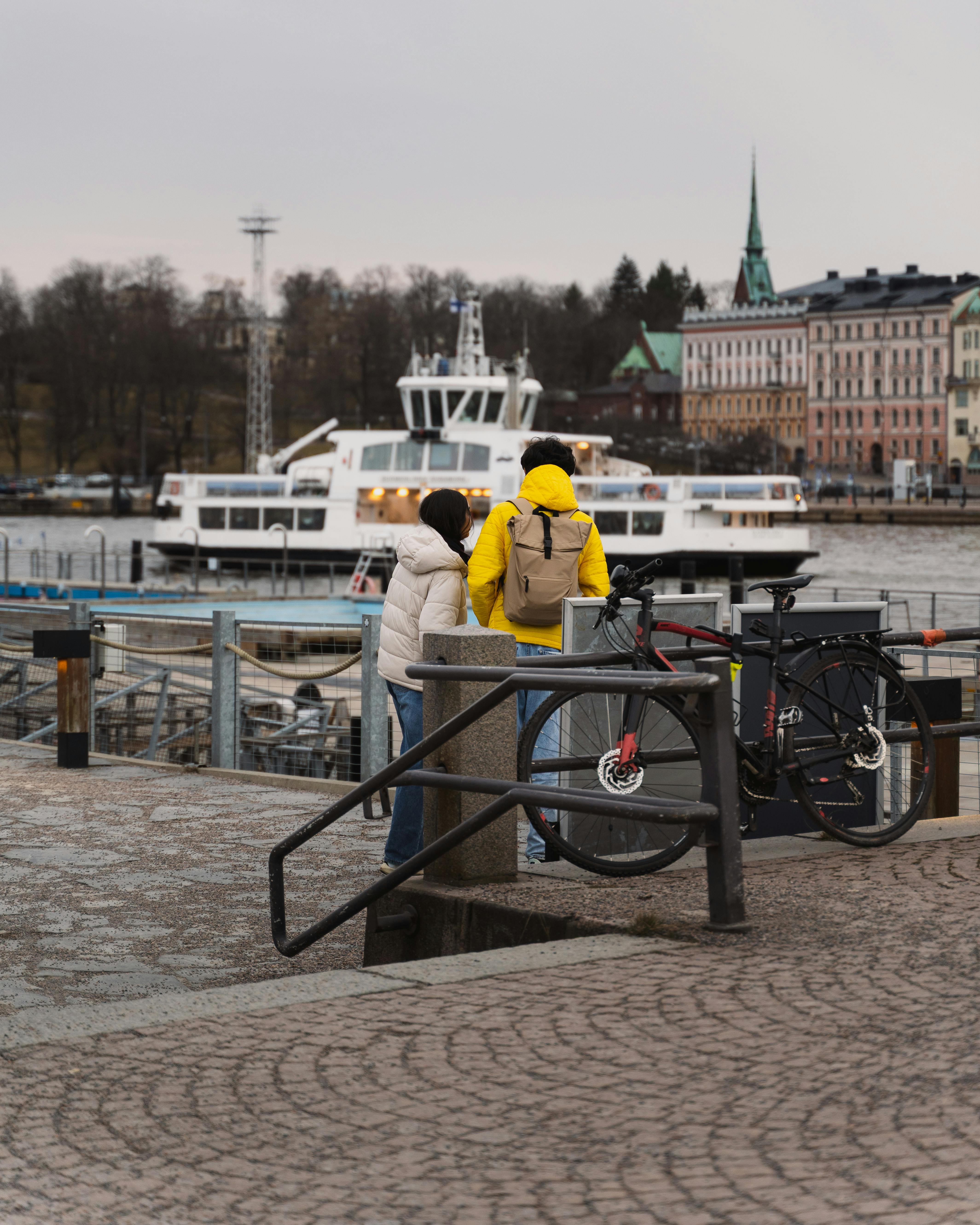Couple at Helsinki Harbor with Ferry Background · Free Stock Photo