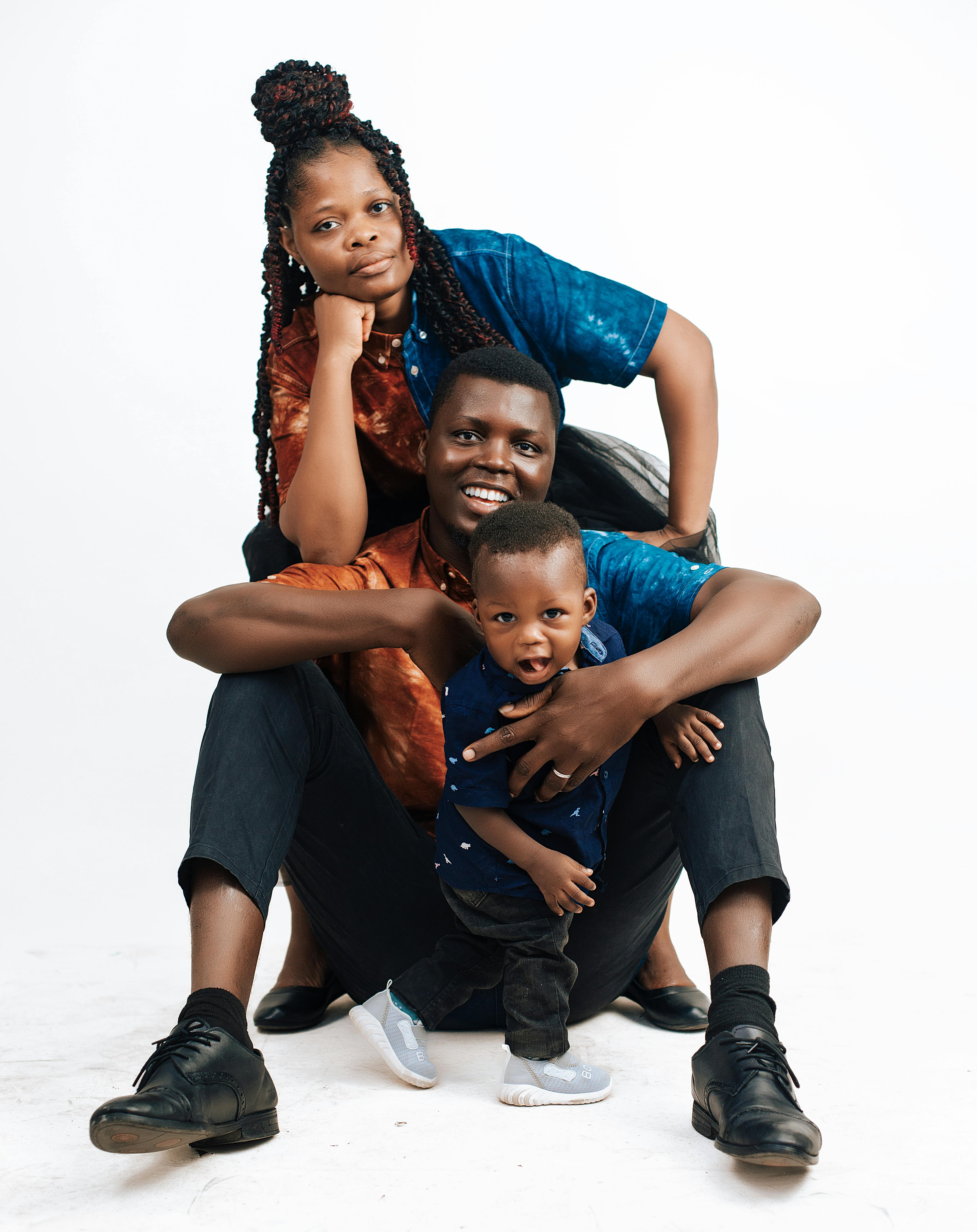 Cheerful African Family Portrait on White Background · Free Stock Photo
