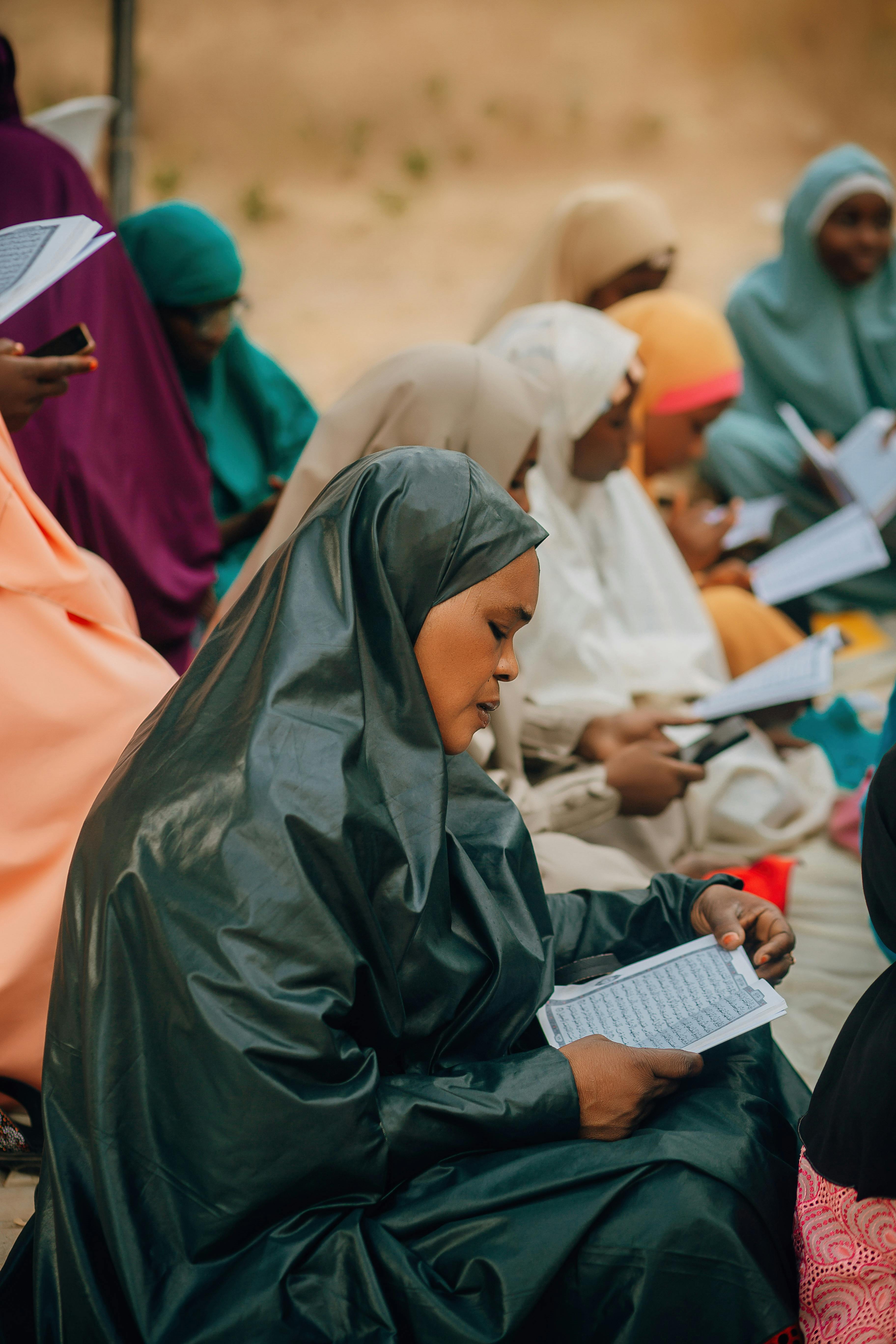 Cultural Gathering with Traditional Attire Outdoors · Free Stock Photo