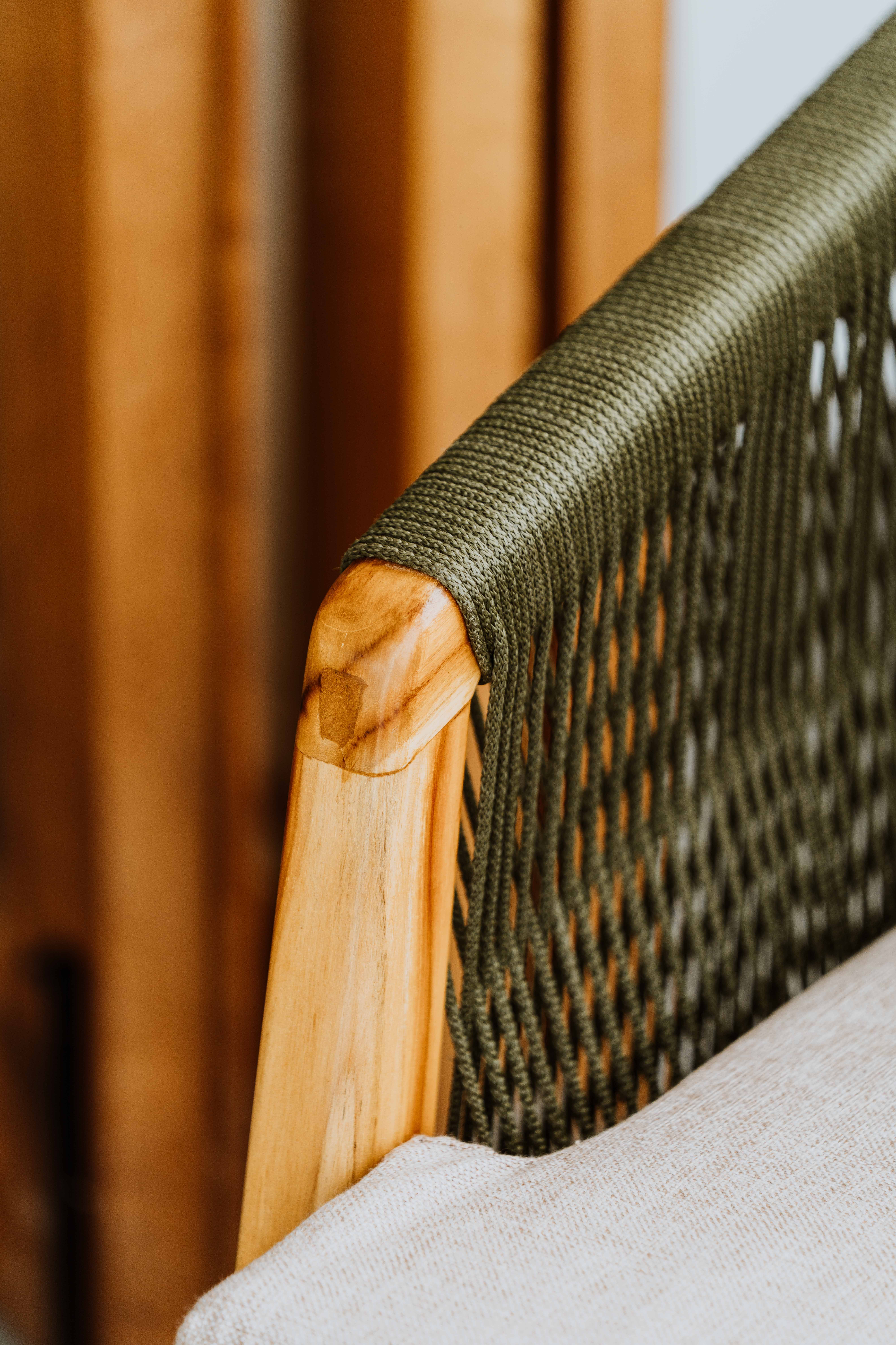 Contemporary Wooden Chair with Woven Armrest Detail · Free Stock Photo