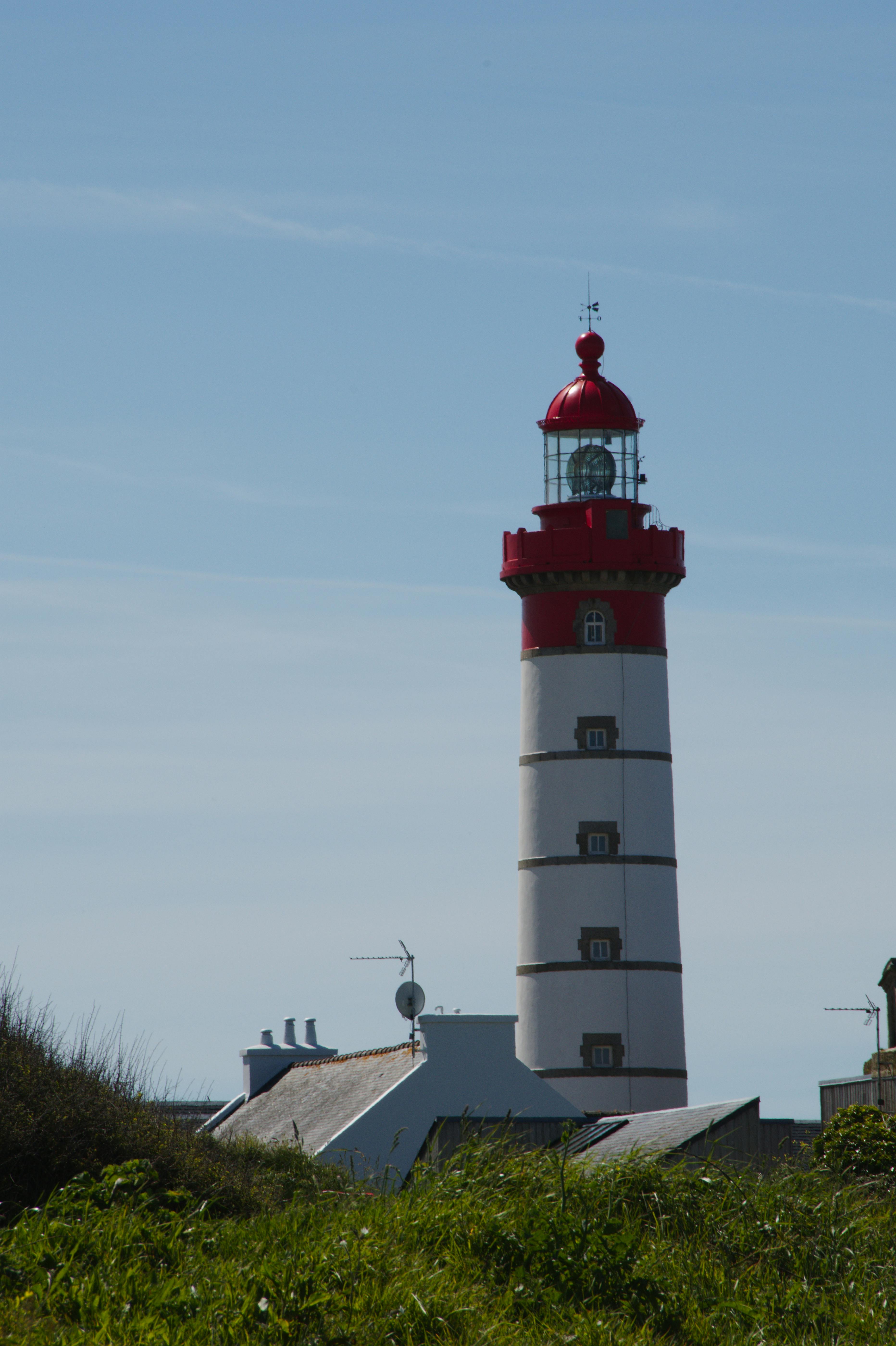 Iconic Lighthouse in Brittany, France Against Clear Sky · Free Stock Photo