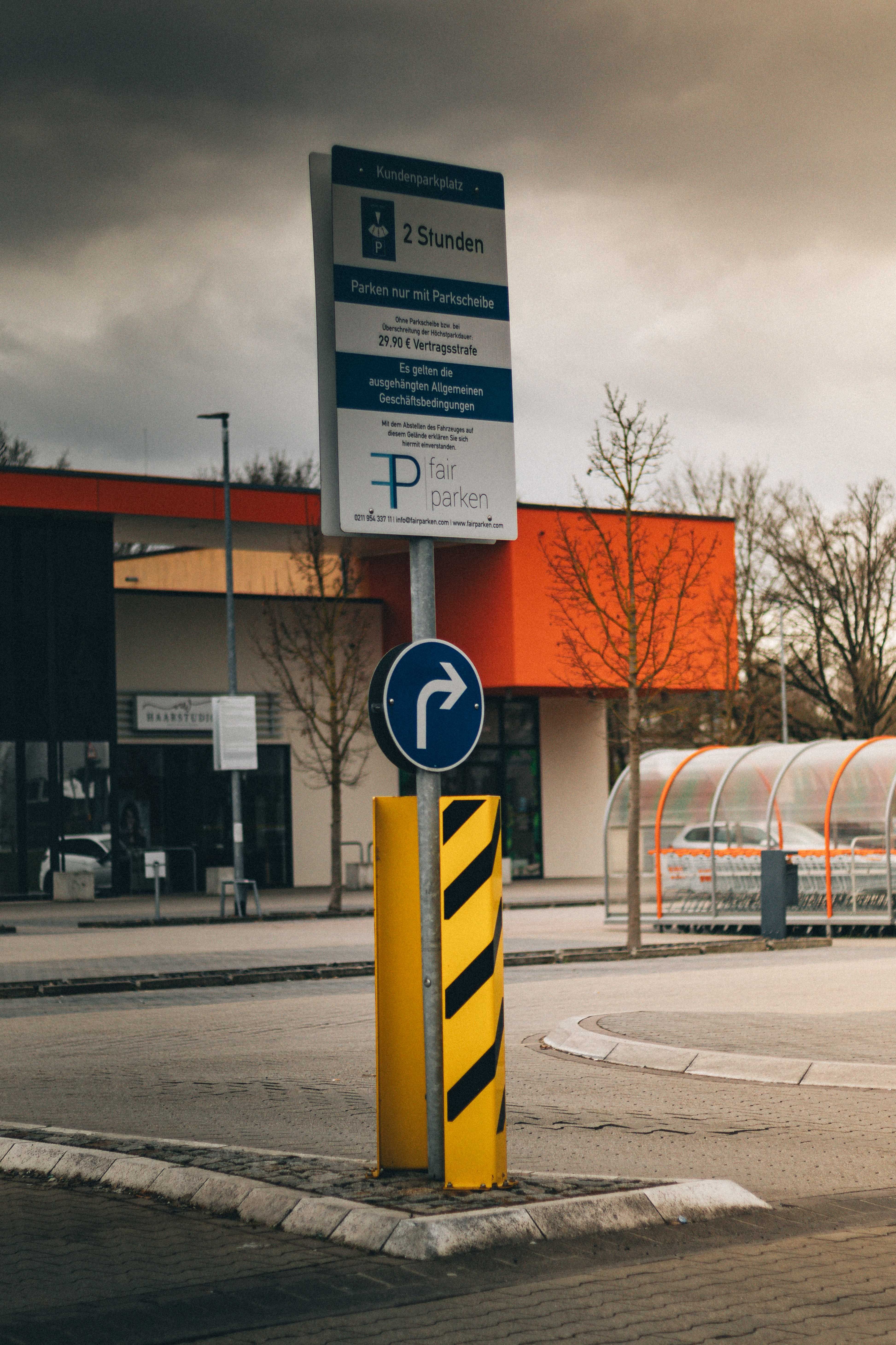 Urban Parking Sign in European Street · Free Stock Photo