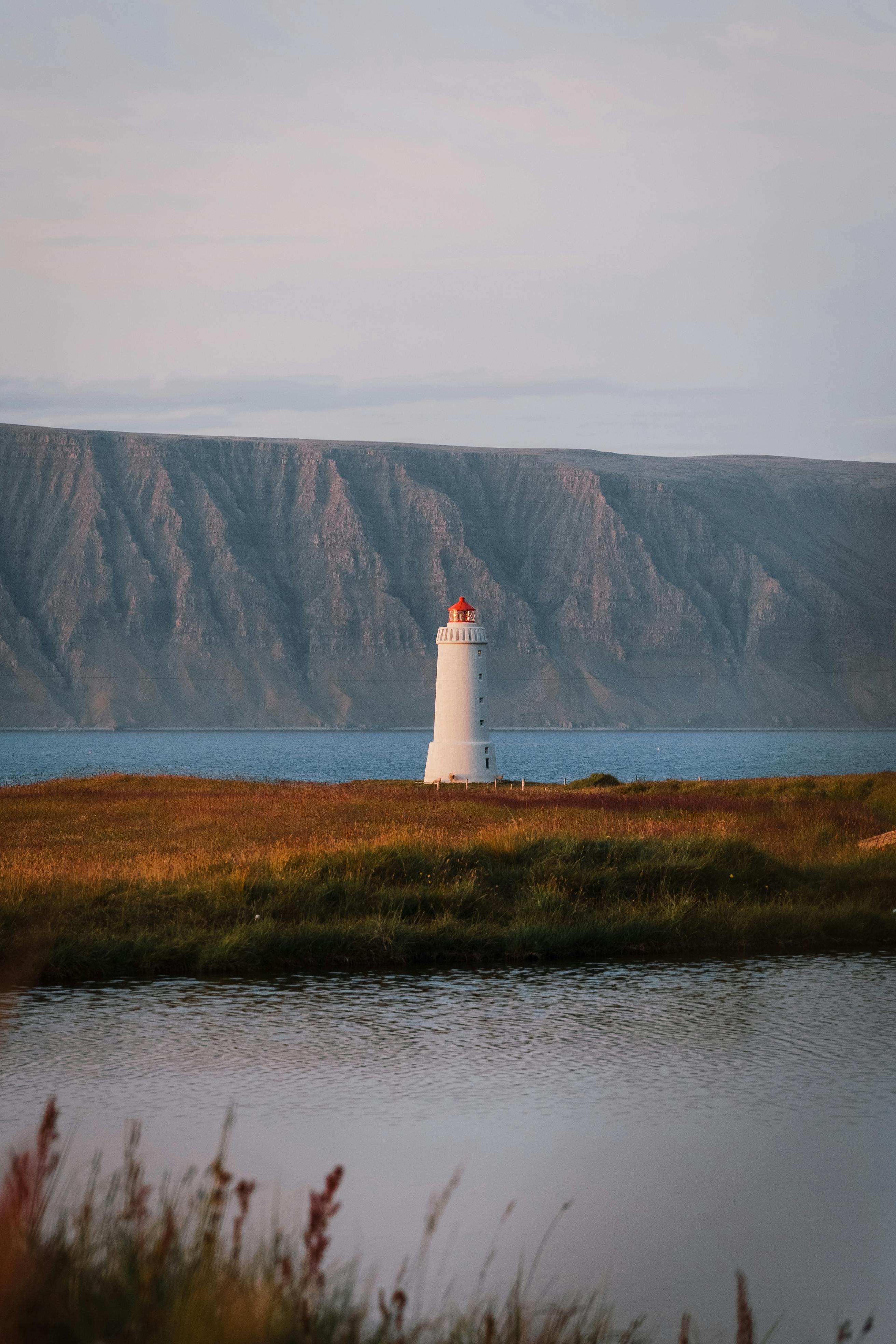 Icelandic Lighthouse in Serene Landscape · Free Stock Photo