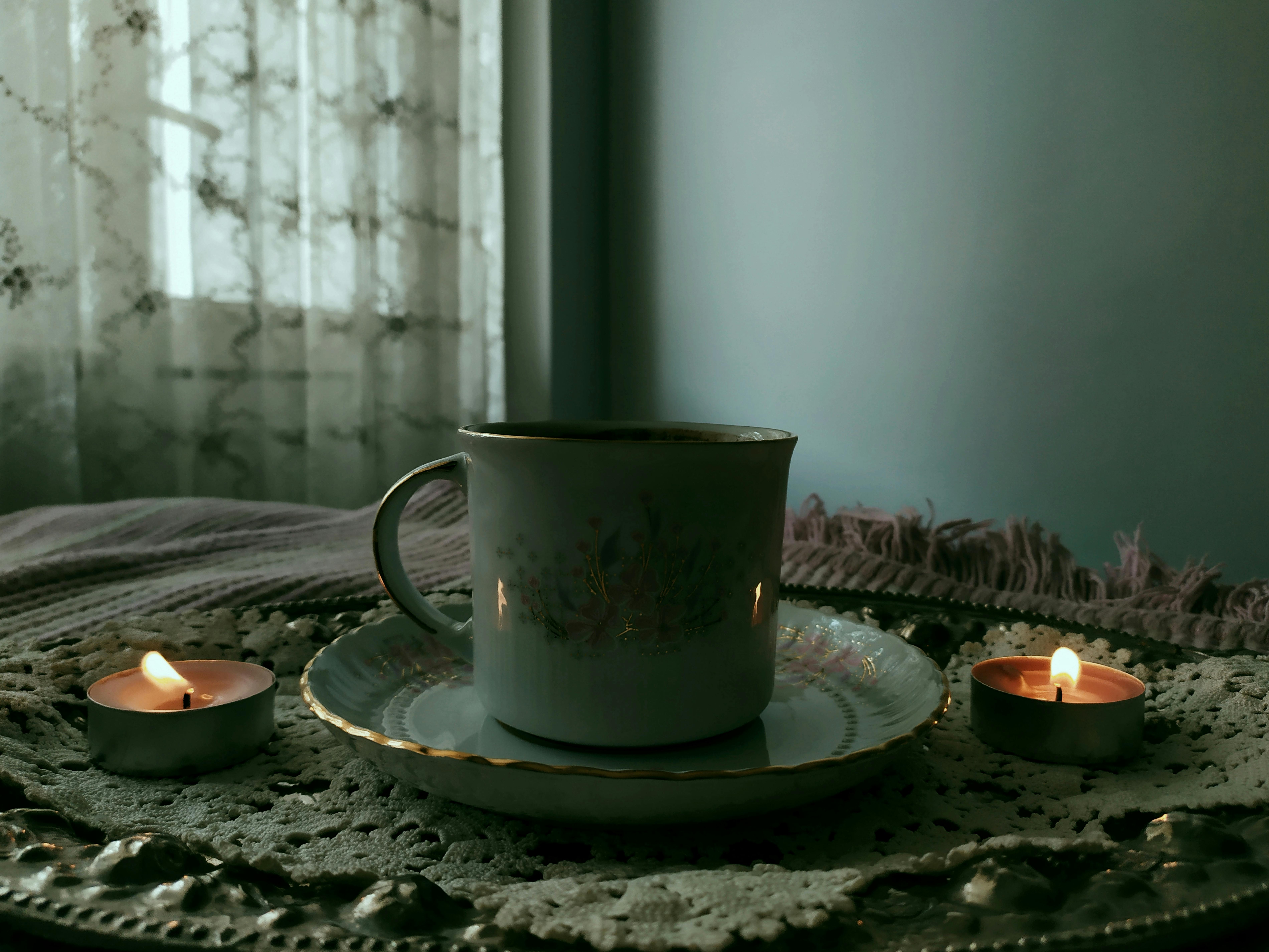 Cozy Candlelit Tea Setting on Tray · Free Stock Photo