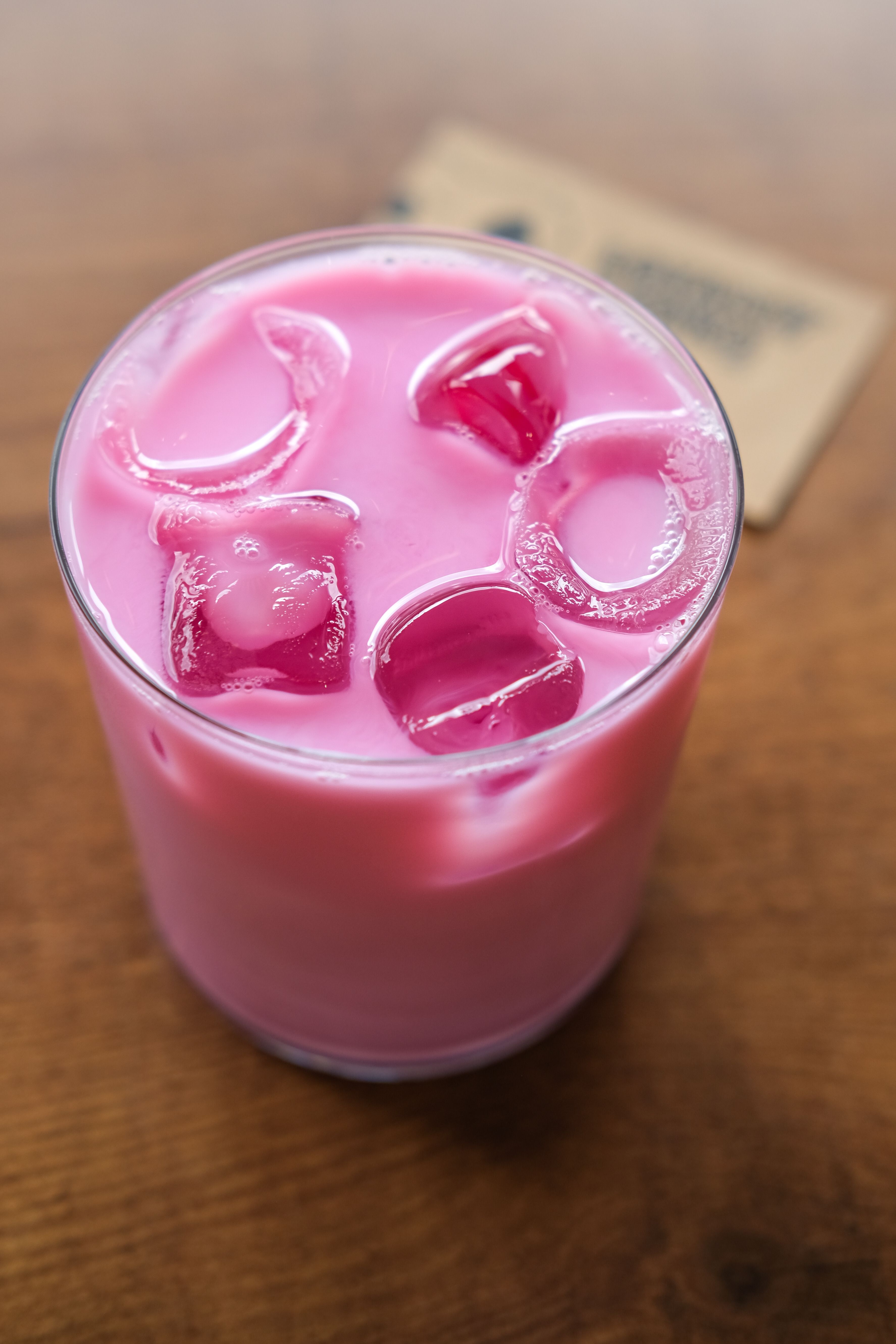 Refreshing Pink Iced Drink with Ice Cubes · Free Stock Photo