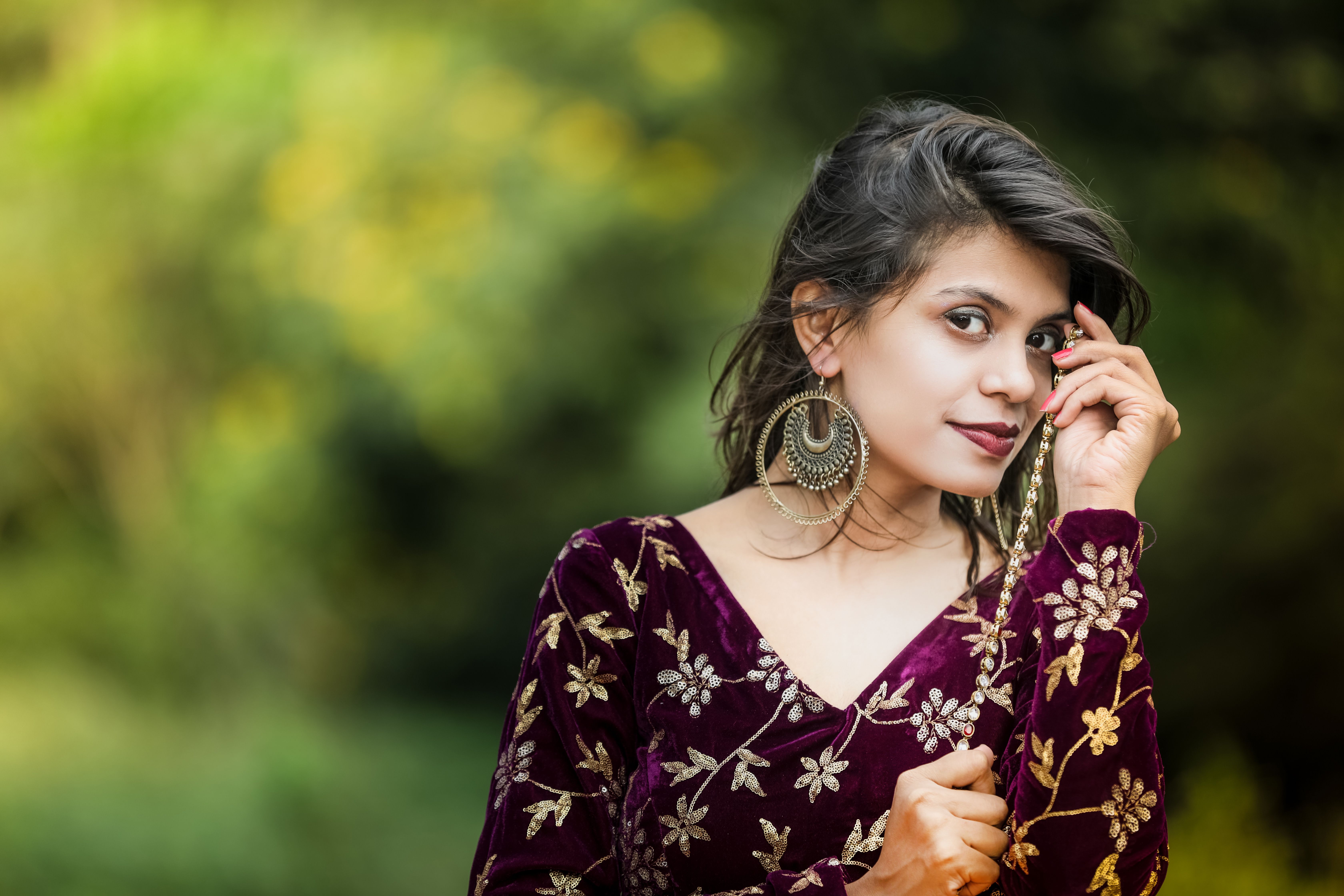 Stylish Indian Model in Floral Attire Outdoors · Free Stock Photo