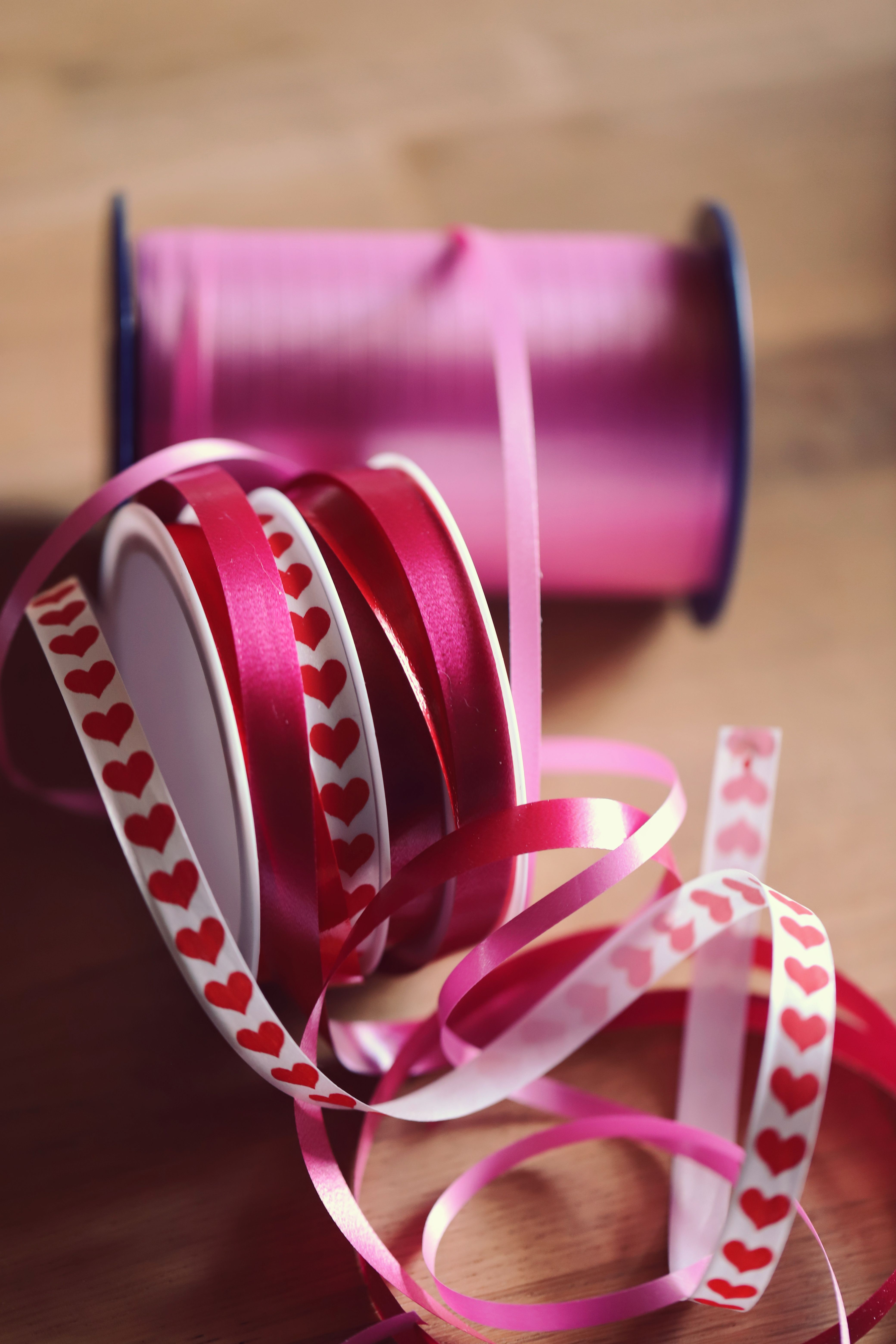 Vibrant Decorative Ribbons with Heart Patterns · Free Stock Photo