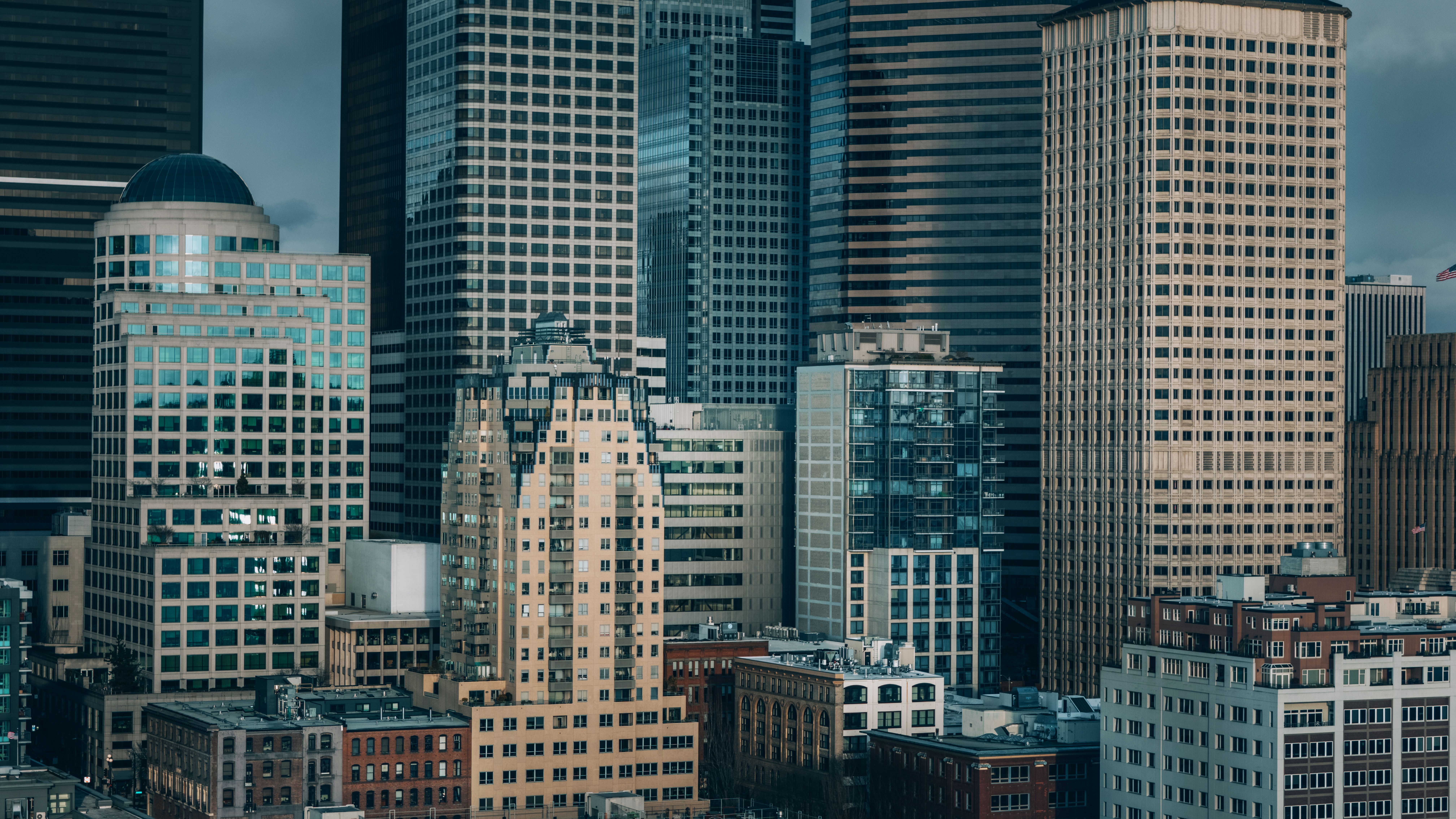 Seattle Skyscrapers Under Cloudy Sky · Free Stock Photo