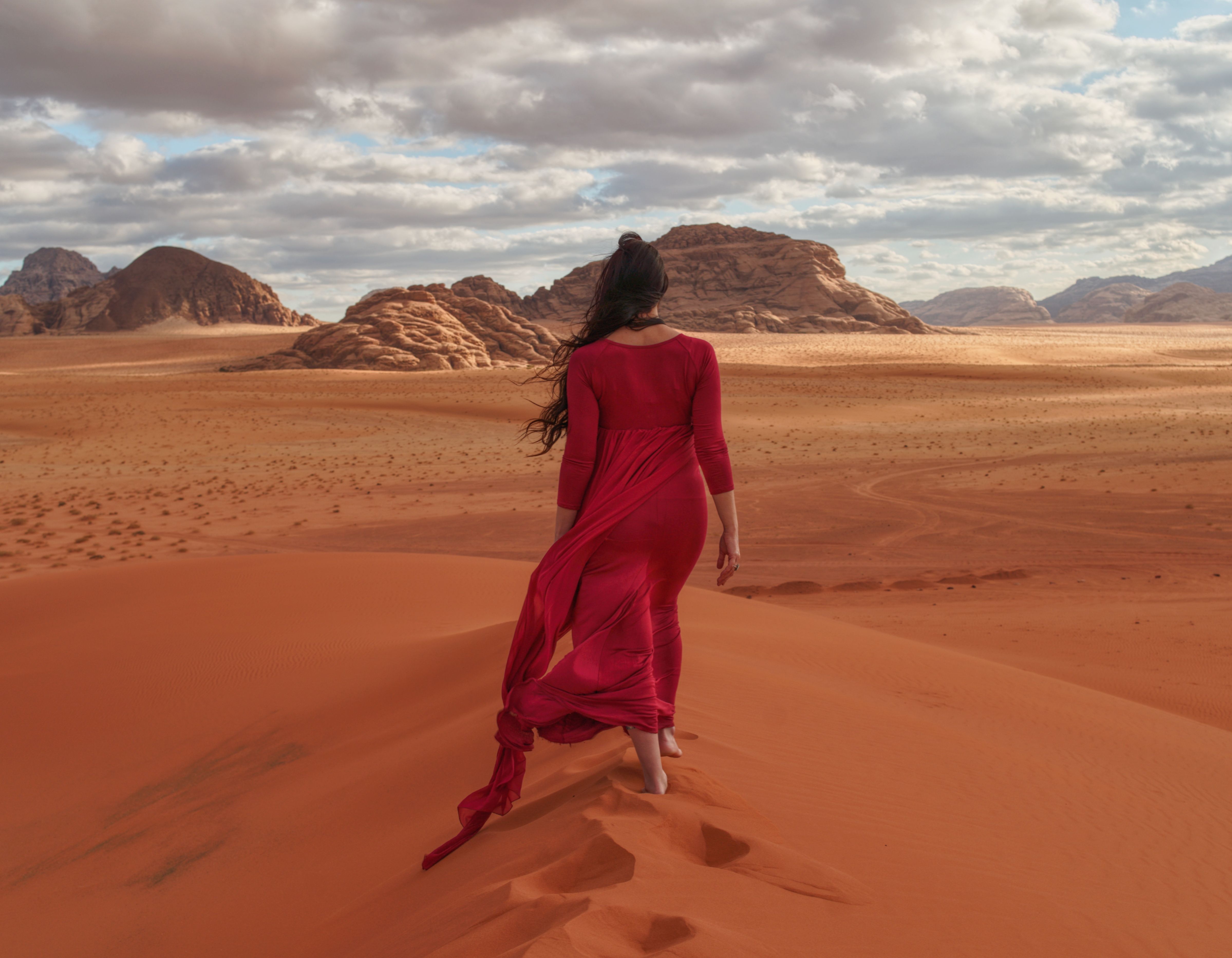 Woman in Red Dress Walking in Jordan Desert · Free Stock Photo