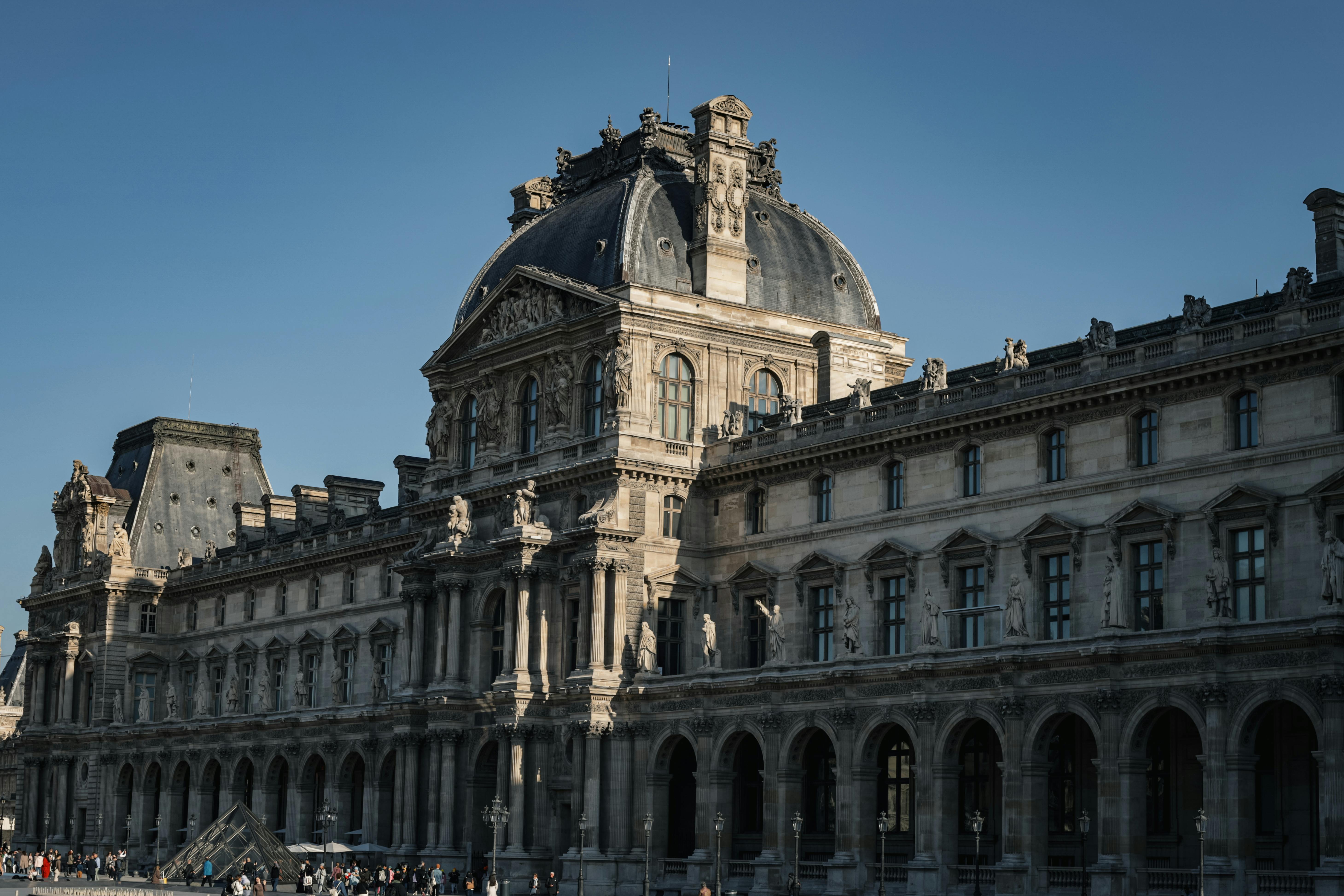 Historic Louvre Museum Architecture in Paris · Free Stock Photo