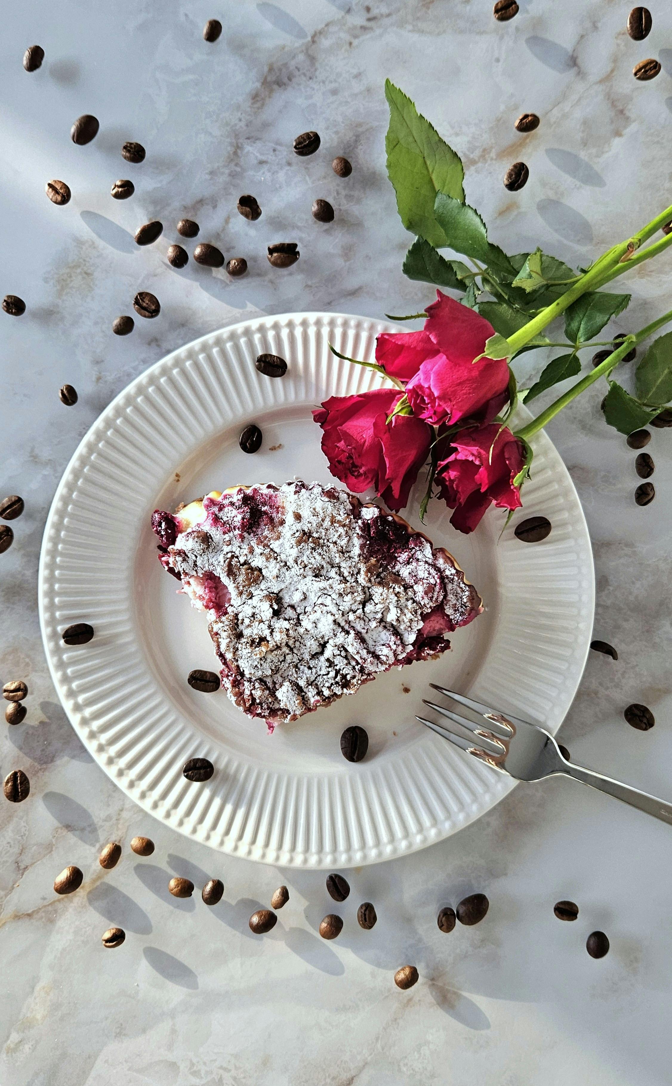 Delicious Berry Cake Slice with Romantic Roses · Free Stock Photo