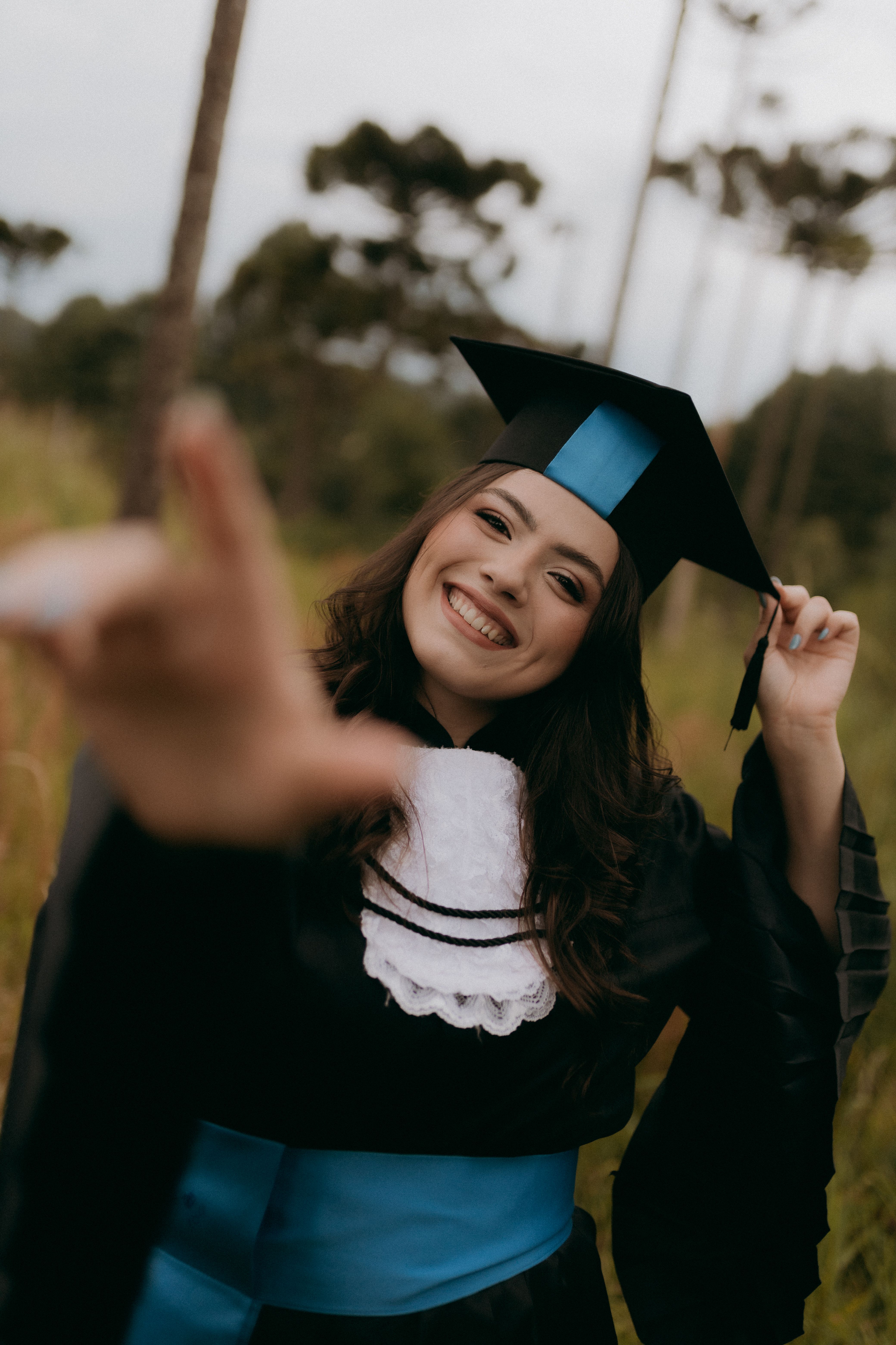 Joyful Graduation Day Celebration Outdoors · Free Stock Photo