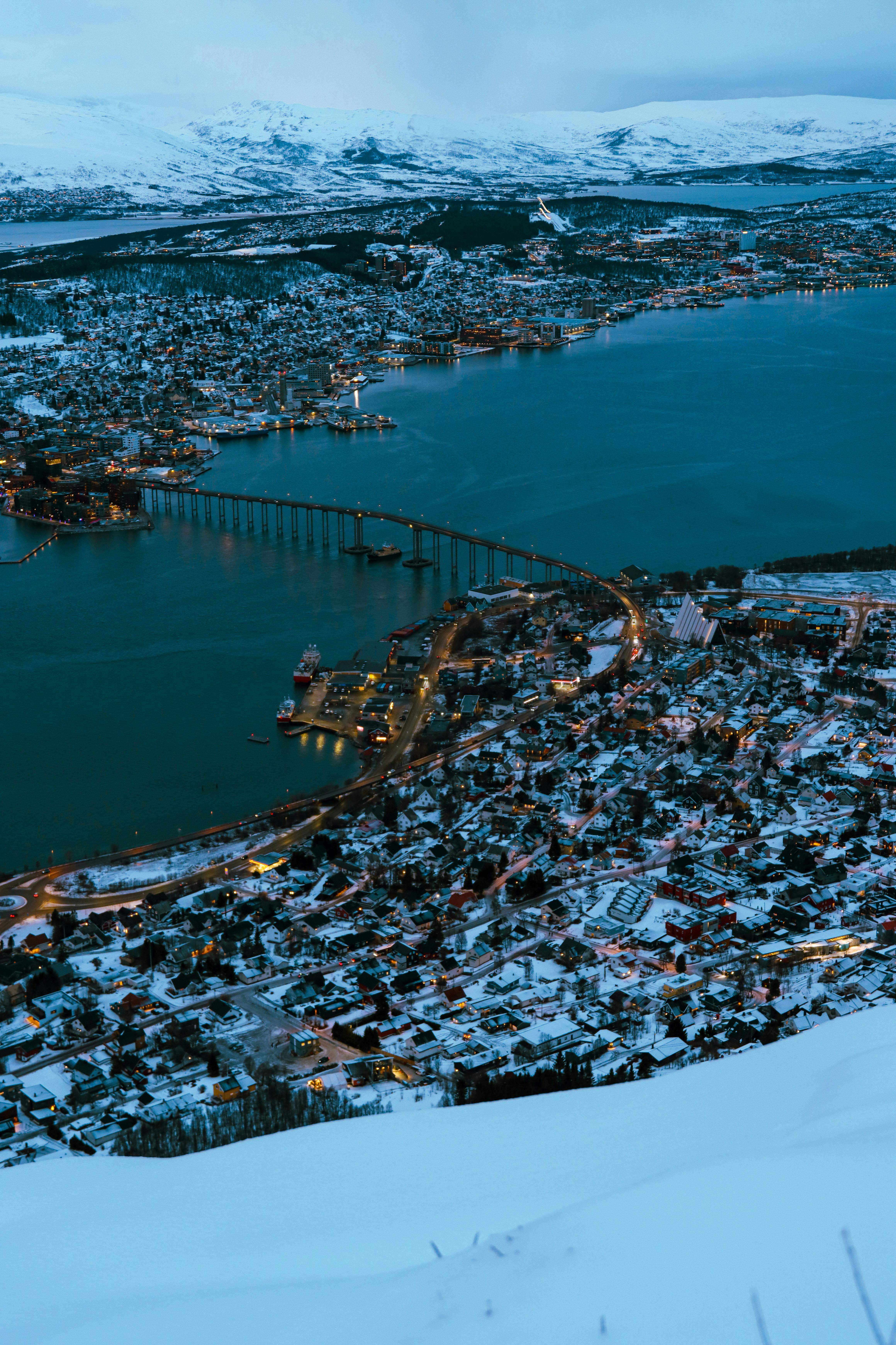 Aerial View of Snowy Tromsø at Twilight · Free Stock Photo