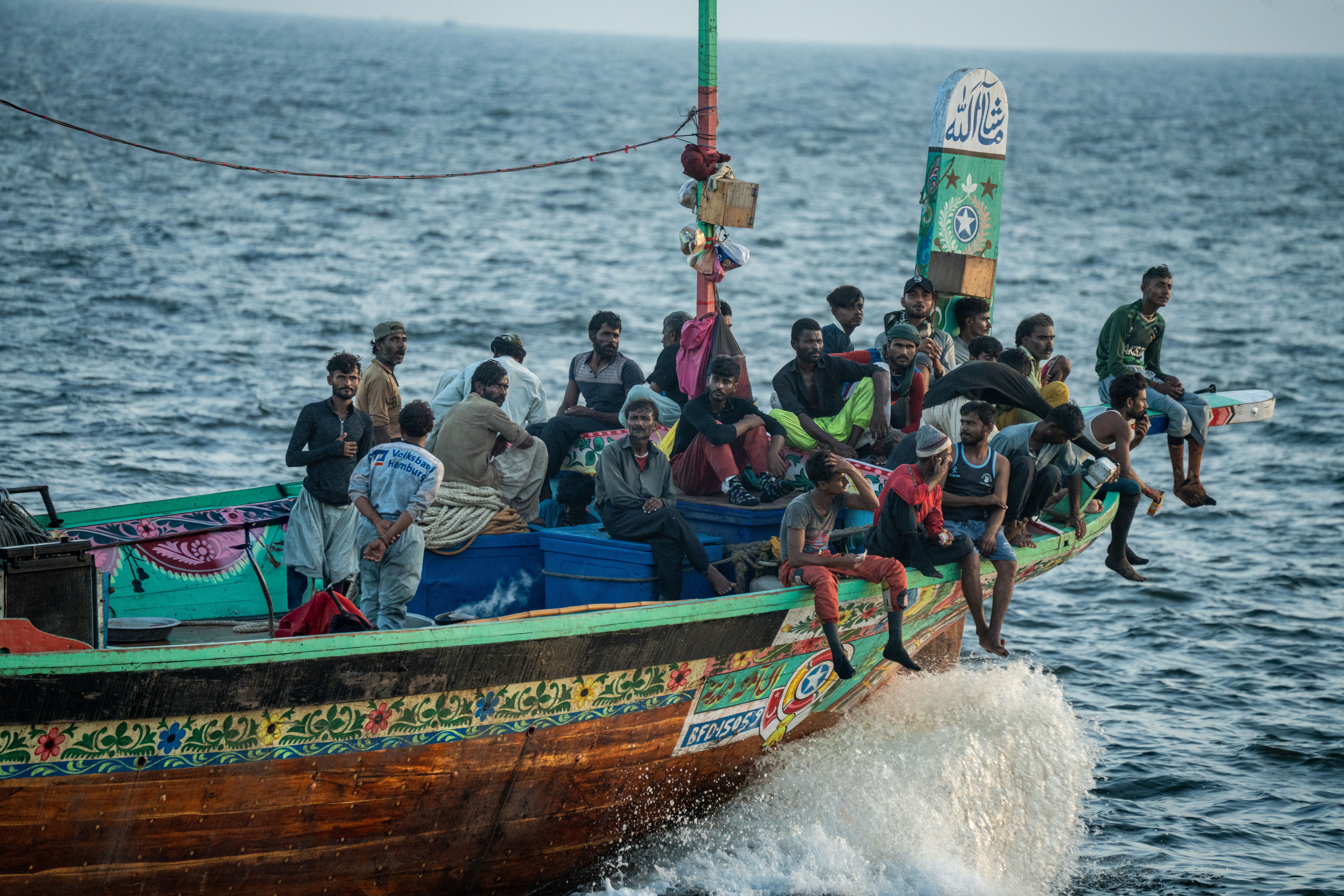 Vibrant Traditional Fishing Boat at Sea · Free Stock Photo