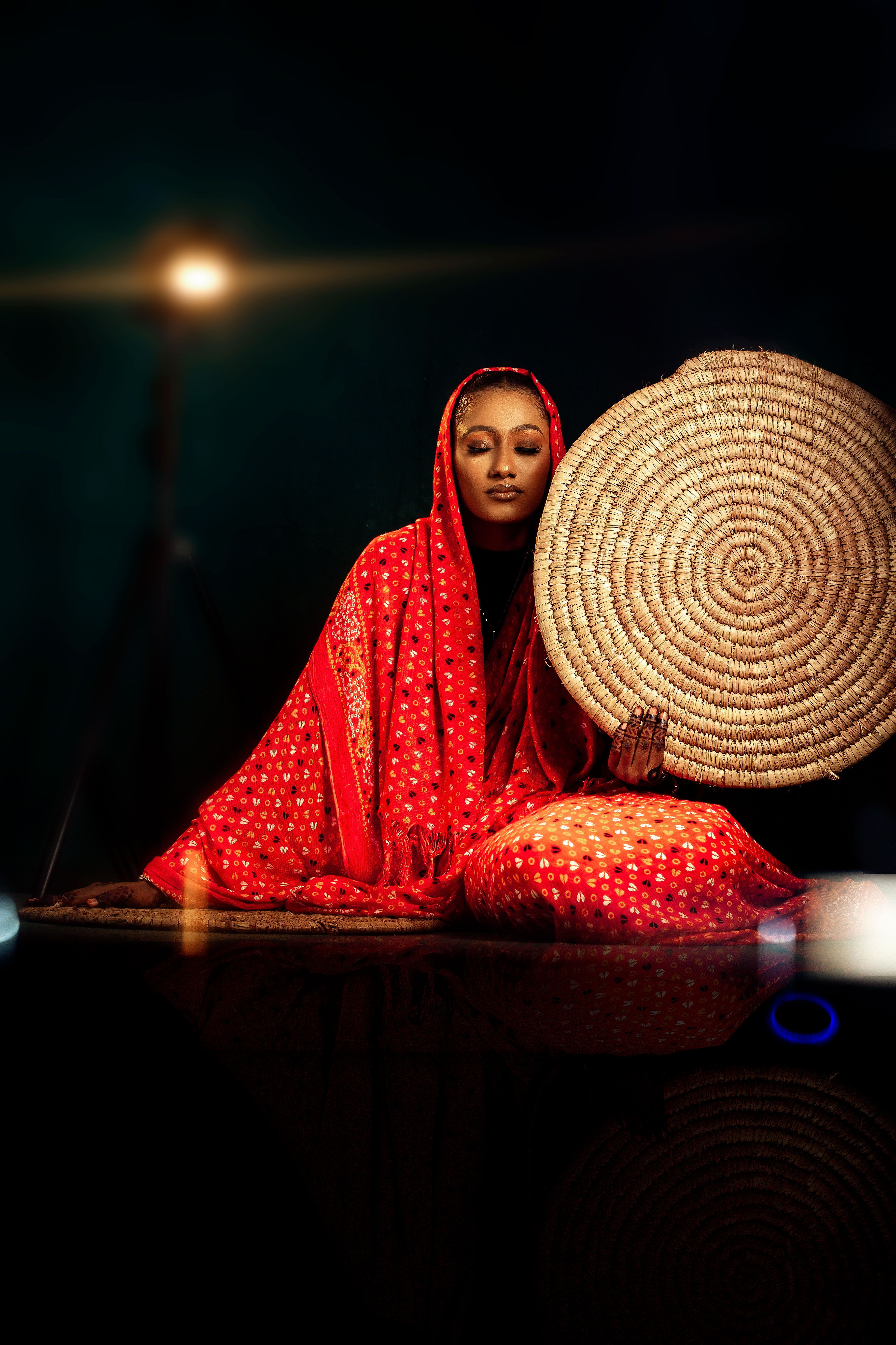 Elegant Woman in Traditional Red Attire with Basket · Free Stock Photo