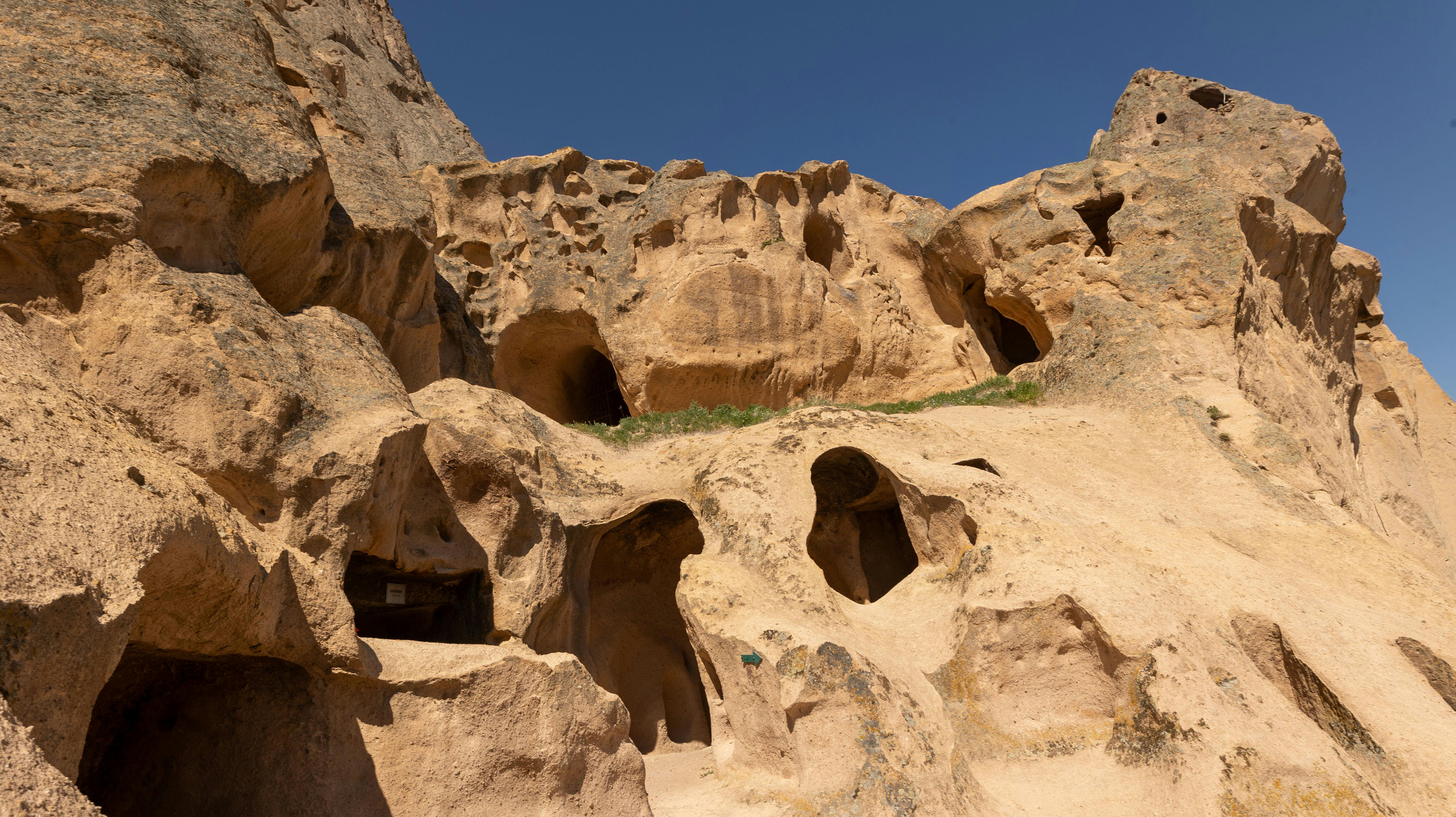 Ancient Rock Caves in Cappadocia, Türkiye · Free Stock Photo