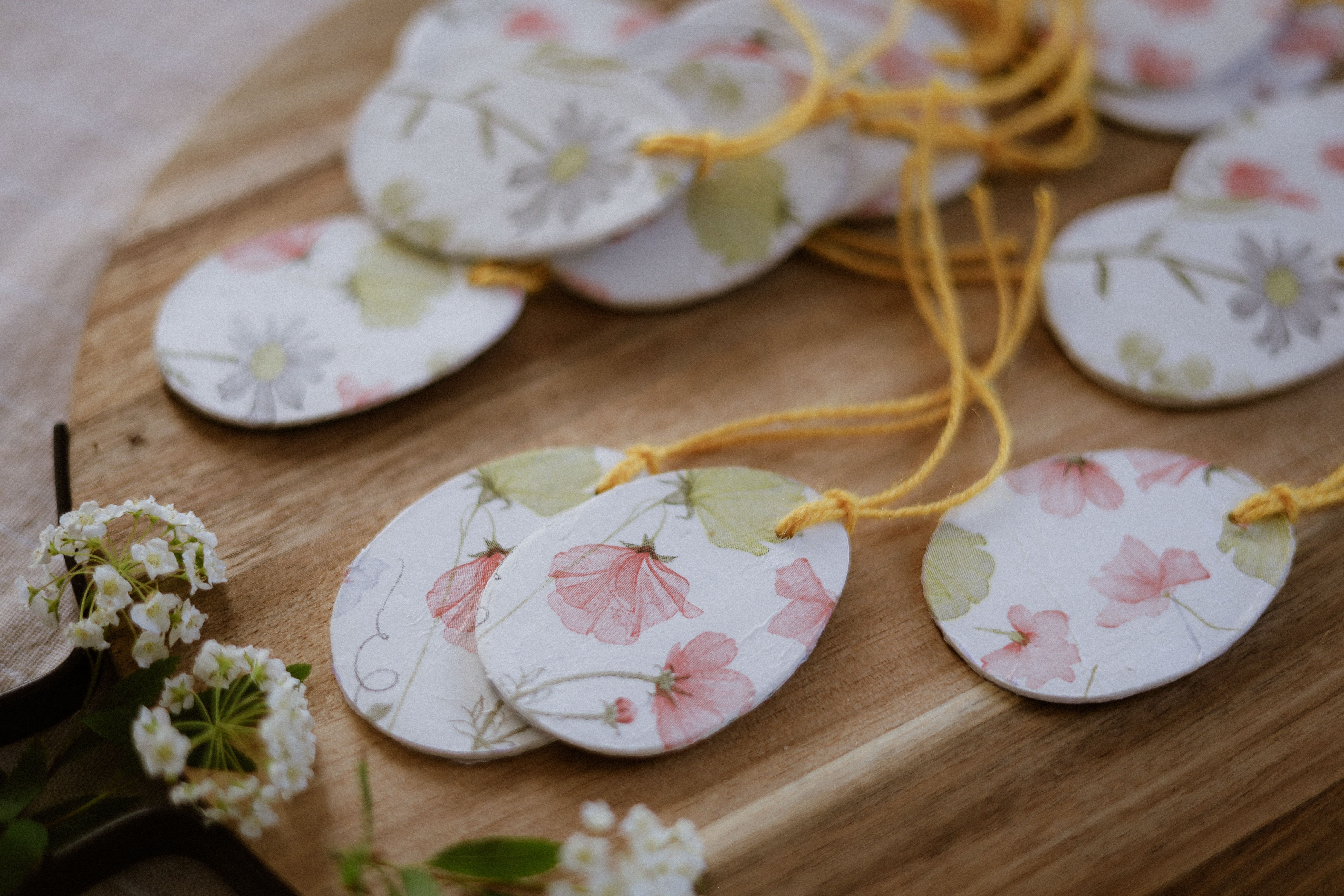 Handmade Floral Gift Tags with Yellow Threads · Free Stock Photo