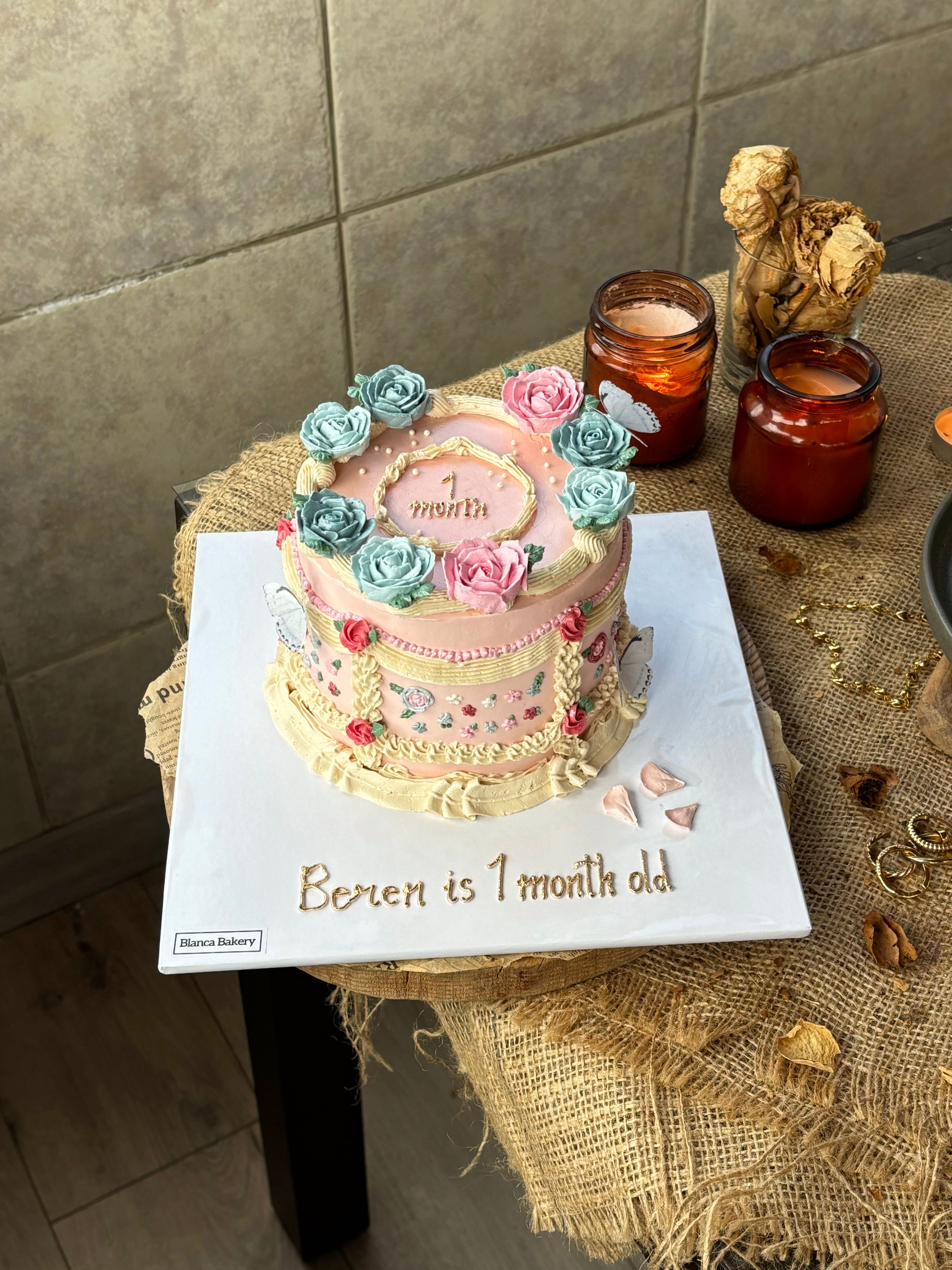 Elegant One-Month Celebration Cake with Flowers · Free Stock Photo